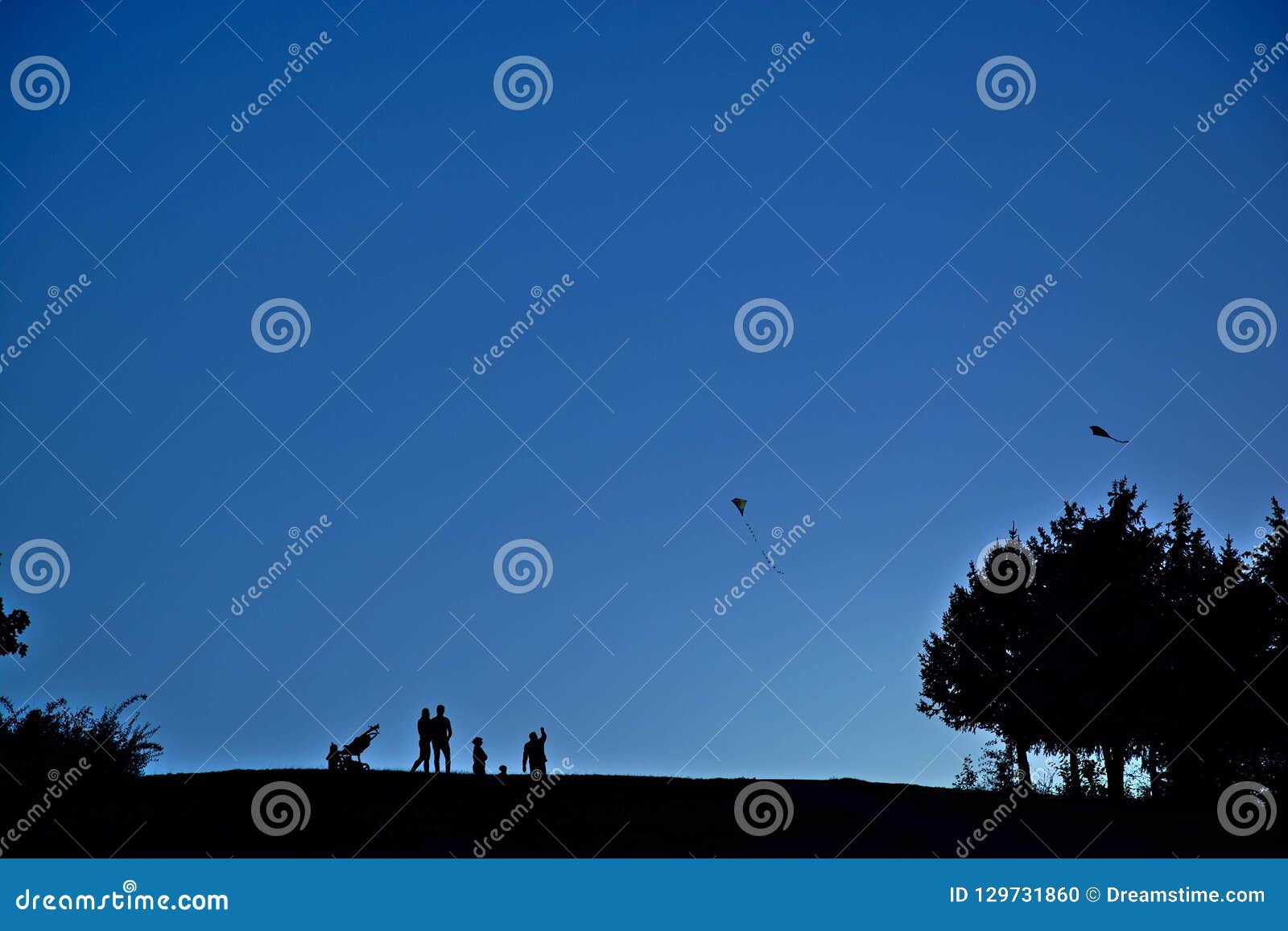 The Silhouette of the Family, Which is Draining the Dragon Stock Photo ...