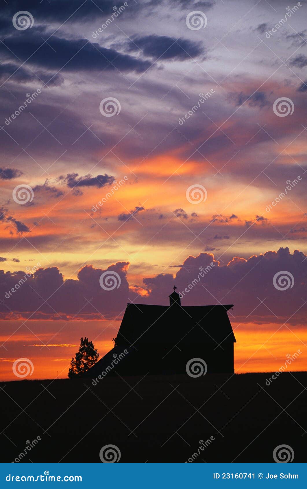 Silhouette of a Farm at Sunset Stock Image - Image of sundown, colorful ...
