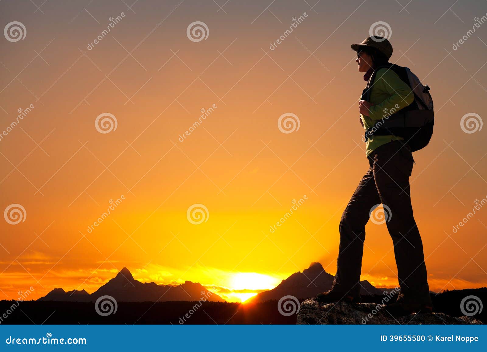 Silhouette of Female Hiker at Sunset. Stock Photo - Image of raised ...