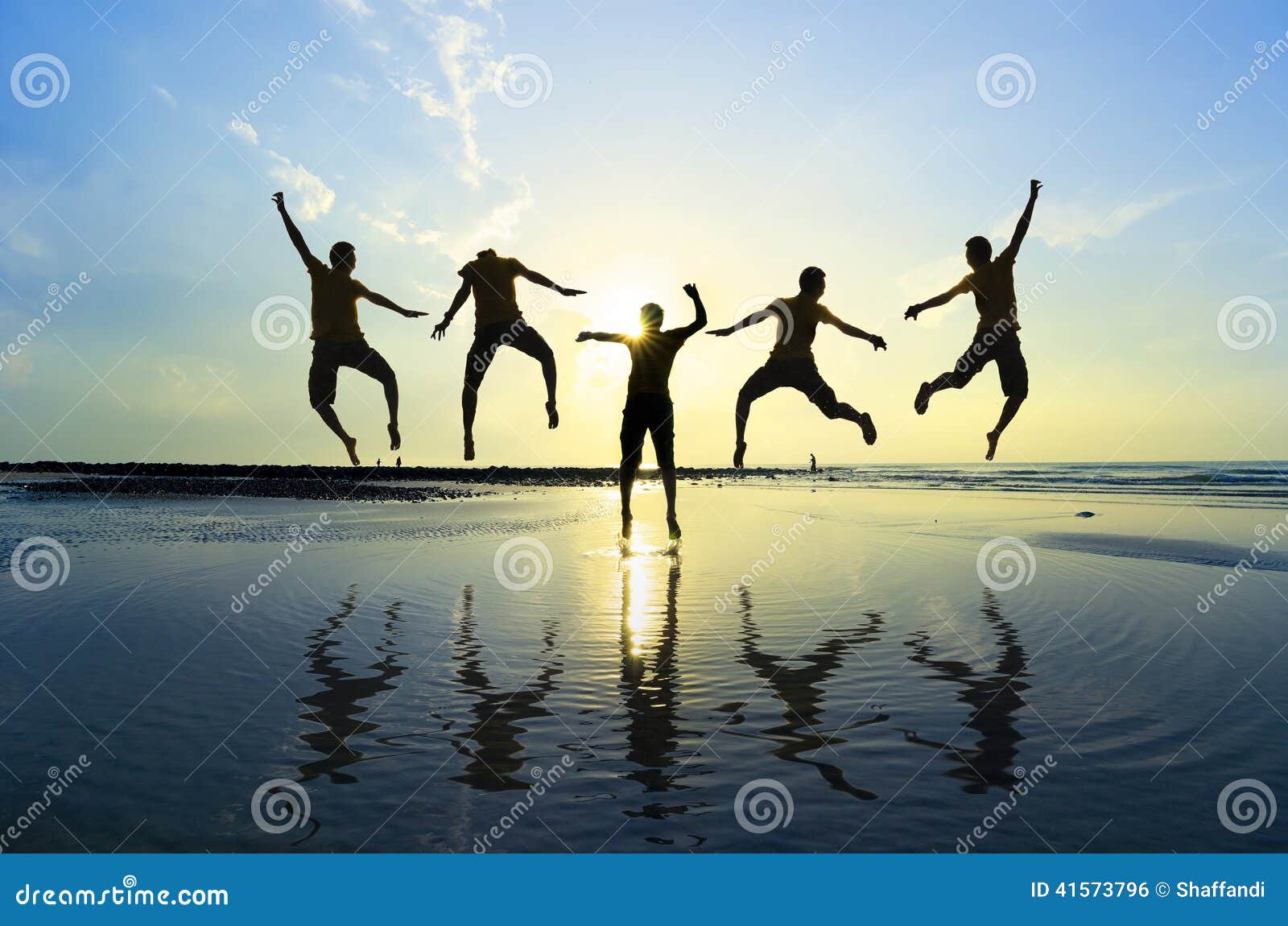 Silhouette of Friends Jumping Over Sun Stock Photo - Image of jumping ...