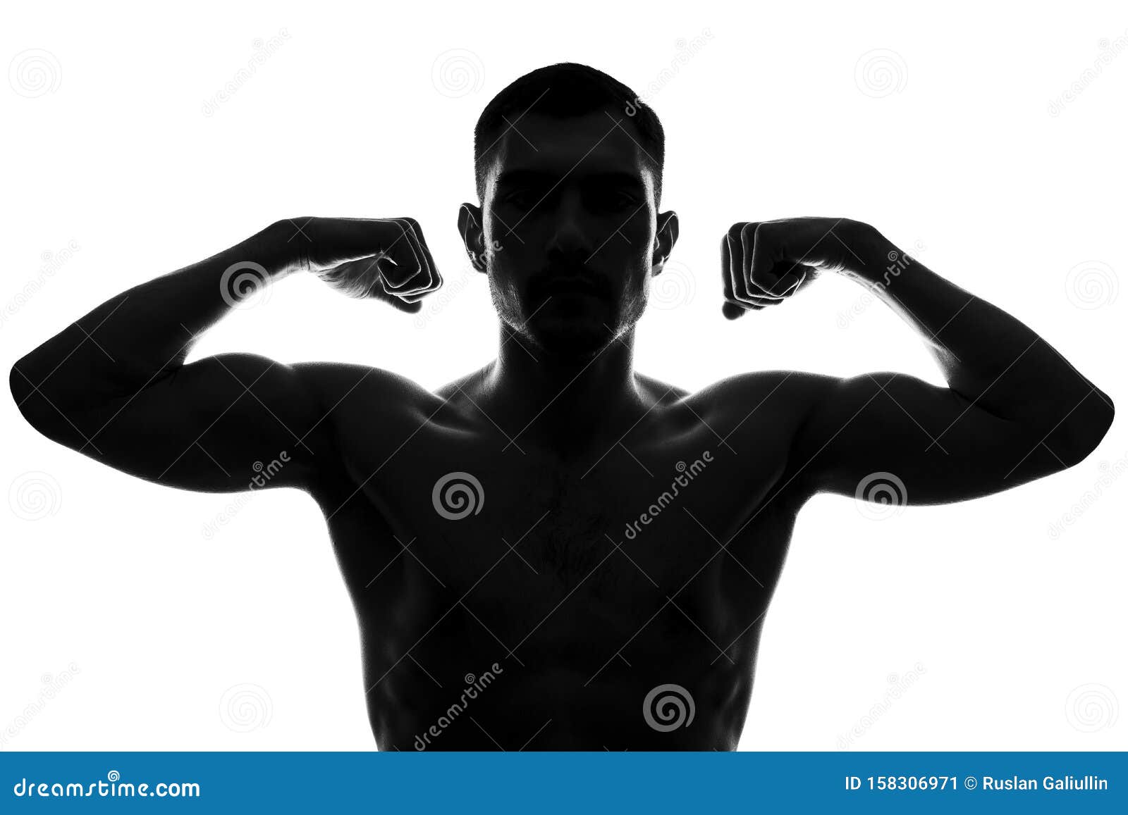 Silhouette, Frontal Portrait of a Man Shows Biceps on Arms with Bare ...