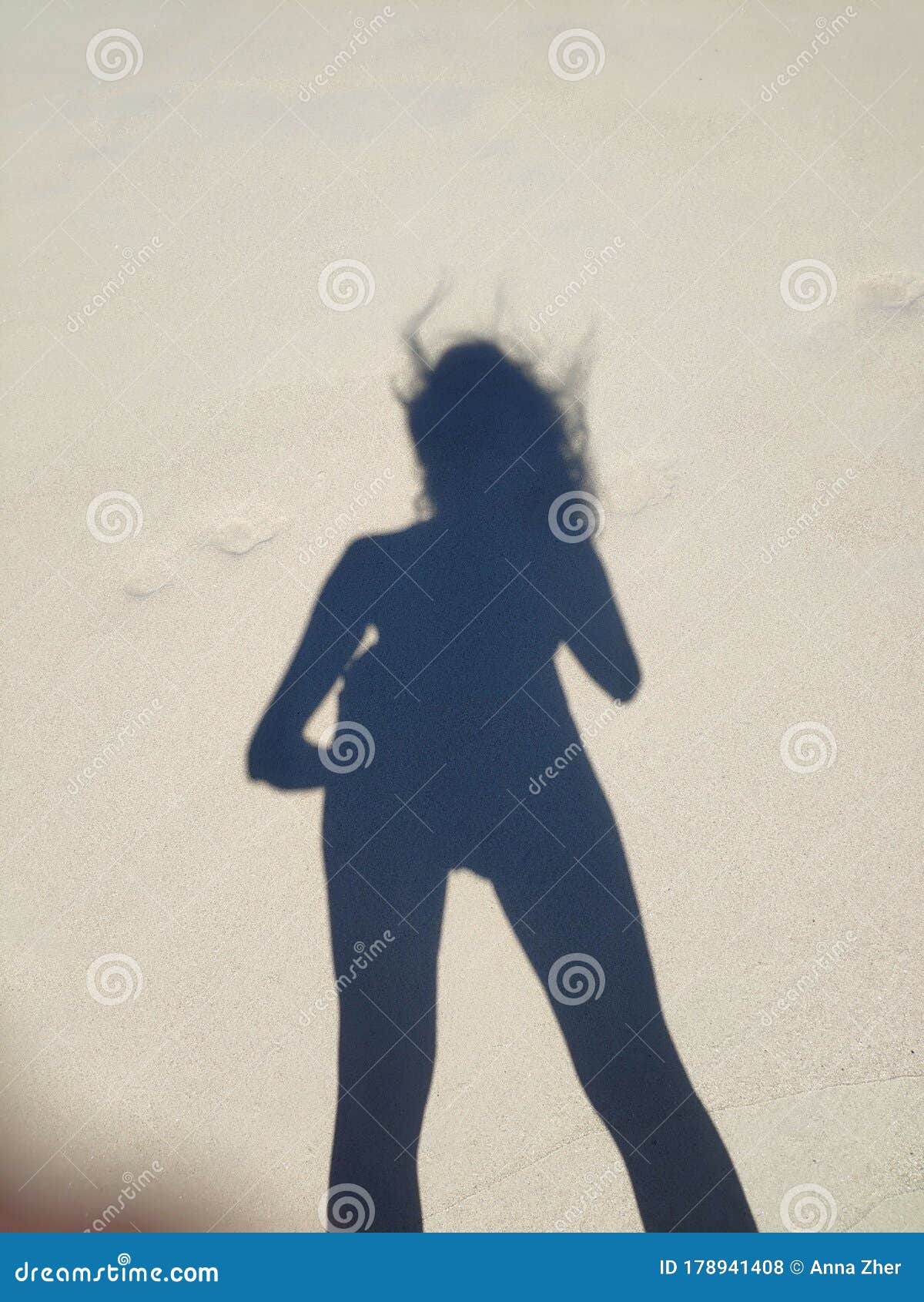 Silhouette of a Girl in the Sand Stock Photo - Image of blue, cartoon ...