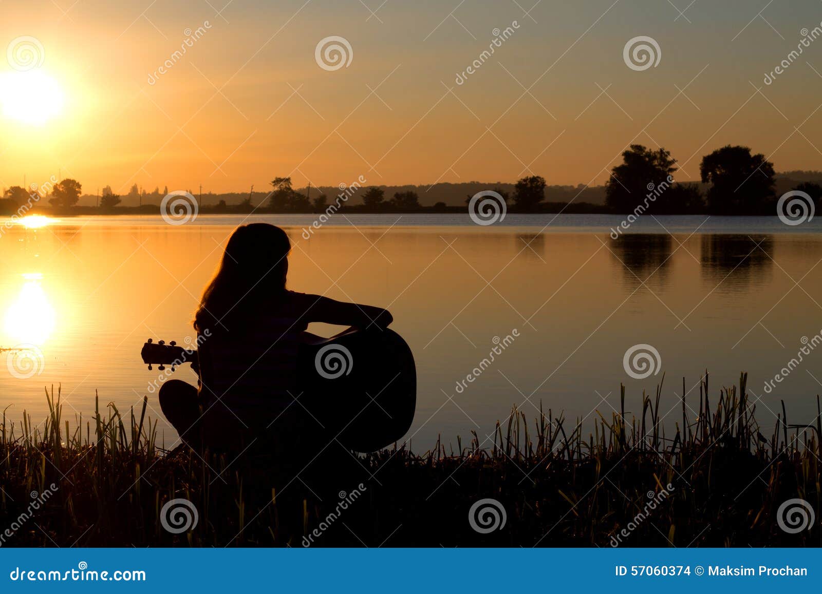 Silhouette of a Girl at Sunset Playing the Guitar Stock Photo - Image ...