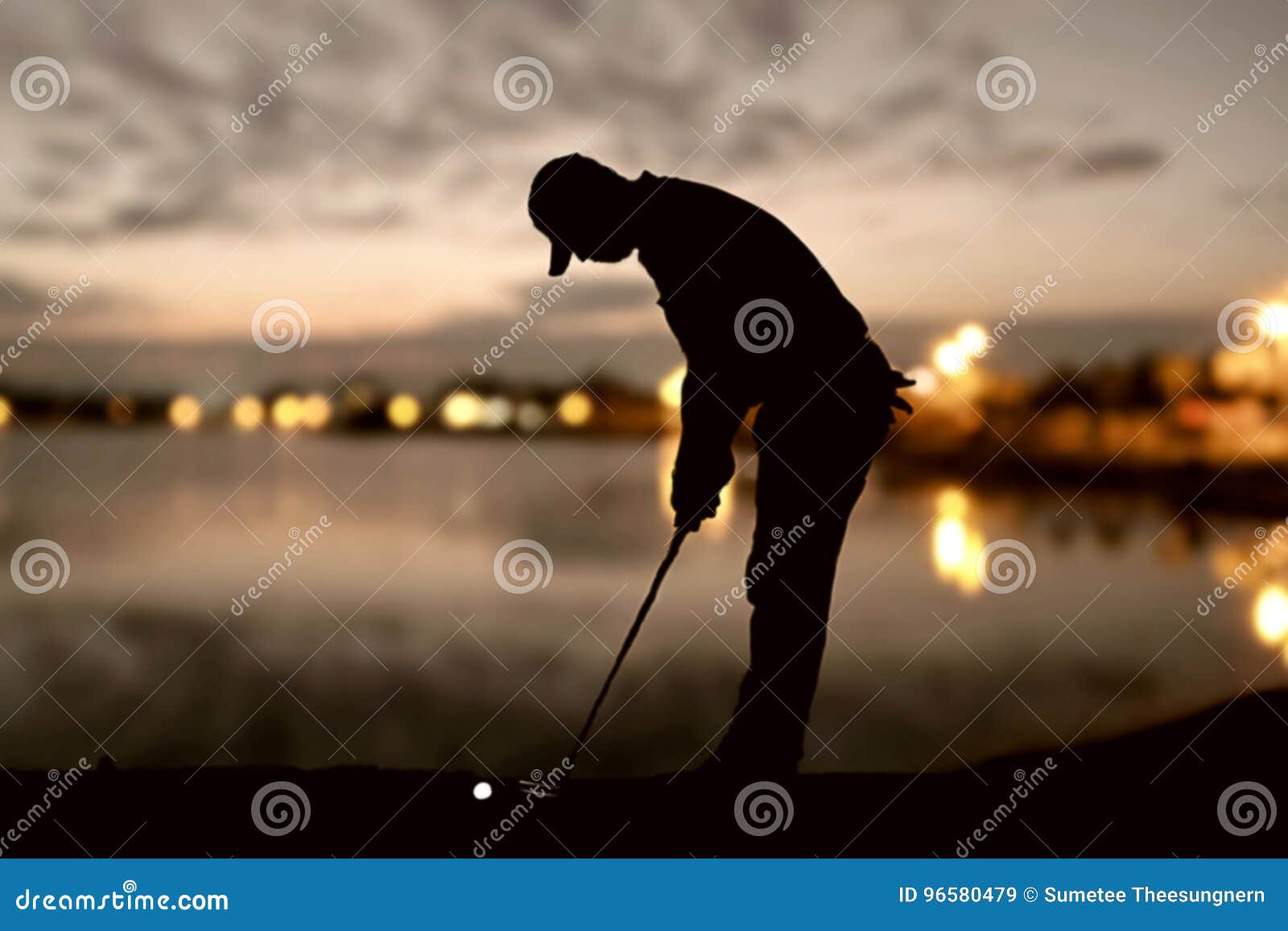 Silhouette of Golfers Hit Sweeping and Keep Golf Course in the Sunset ...