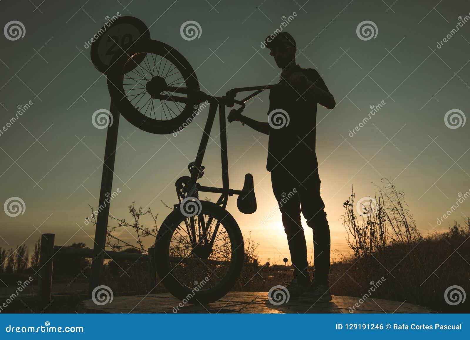 Silhouette of a Guy with a Bmx at Sunset Stock Photo - Image of ...
