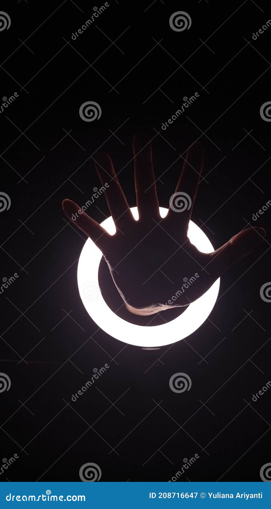 Silhouette of a Hand Passing the Light Stock Image - Image of ...