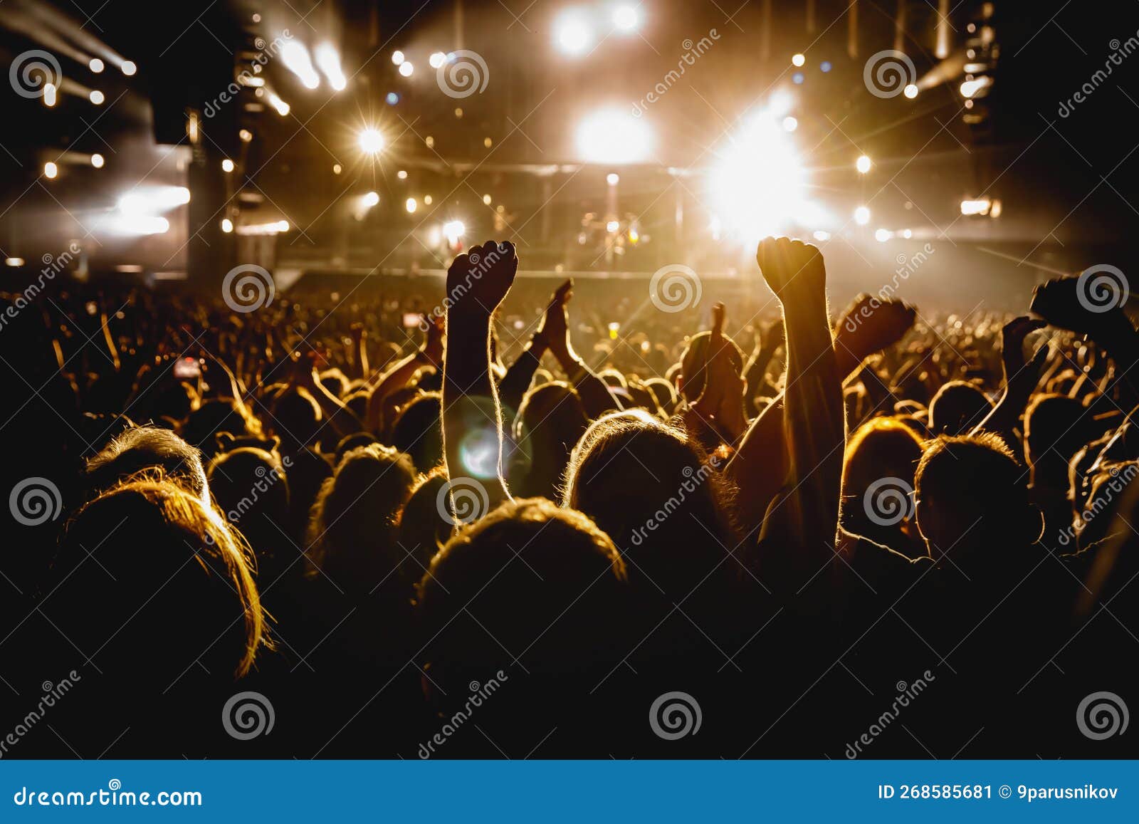 Silhouette of a Happy Crowd with Hands Up during a Big Rock Concert ...