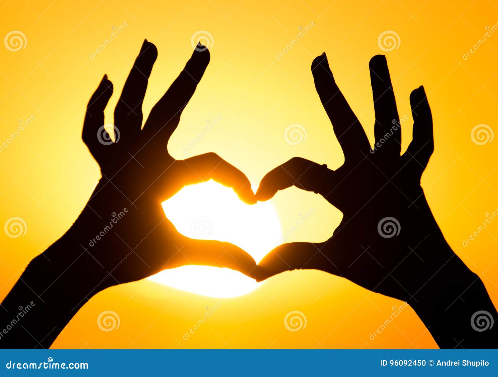 Silhouette of the Heart by Hands at Sunset Stock Photo - Image of ...