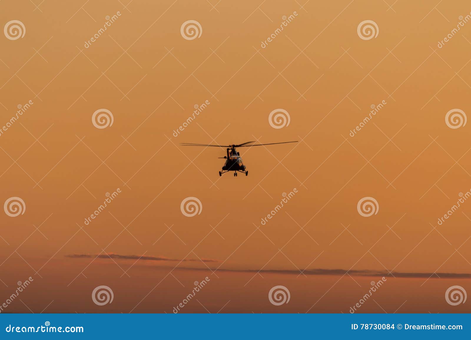 Helicopter In The Air And Sunset Sky In Background Royalty-Free Stock ...