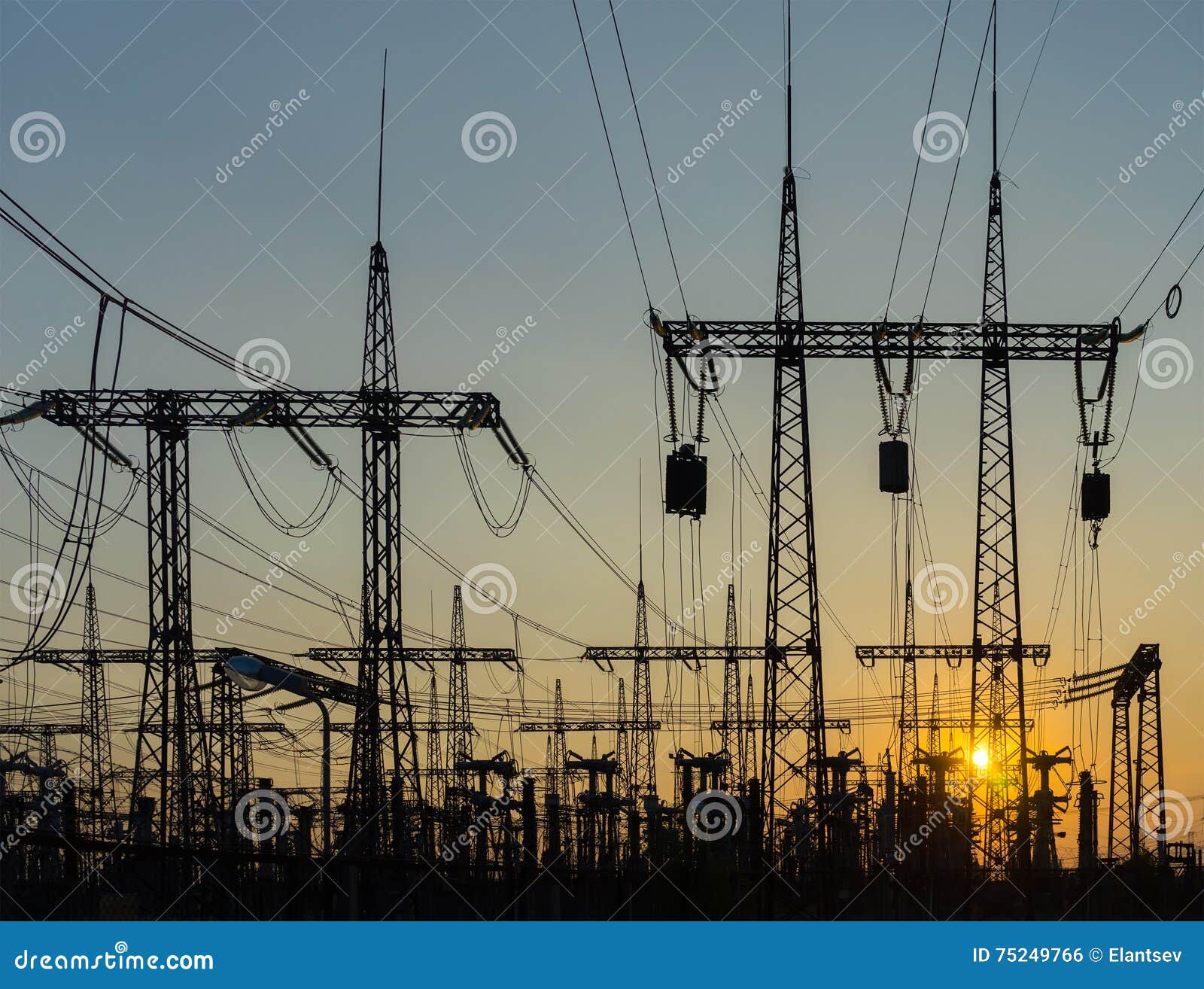 Silhouette of High Voltage Power Lines with Transformers at Suns Stock ...