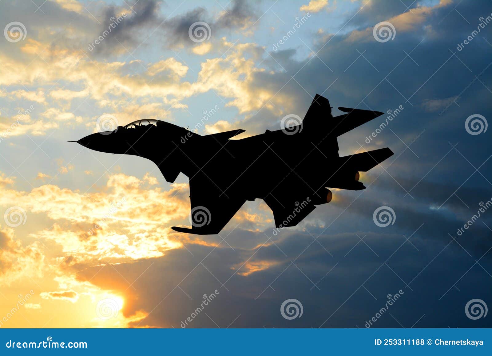 Silhouette of Jet Fighter in Cloudy Sky at Sunrise Stock Photo - Image ...
