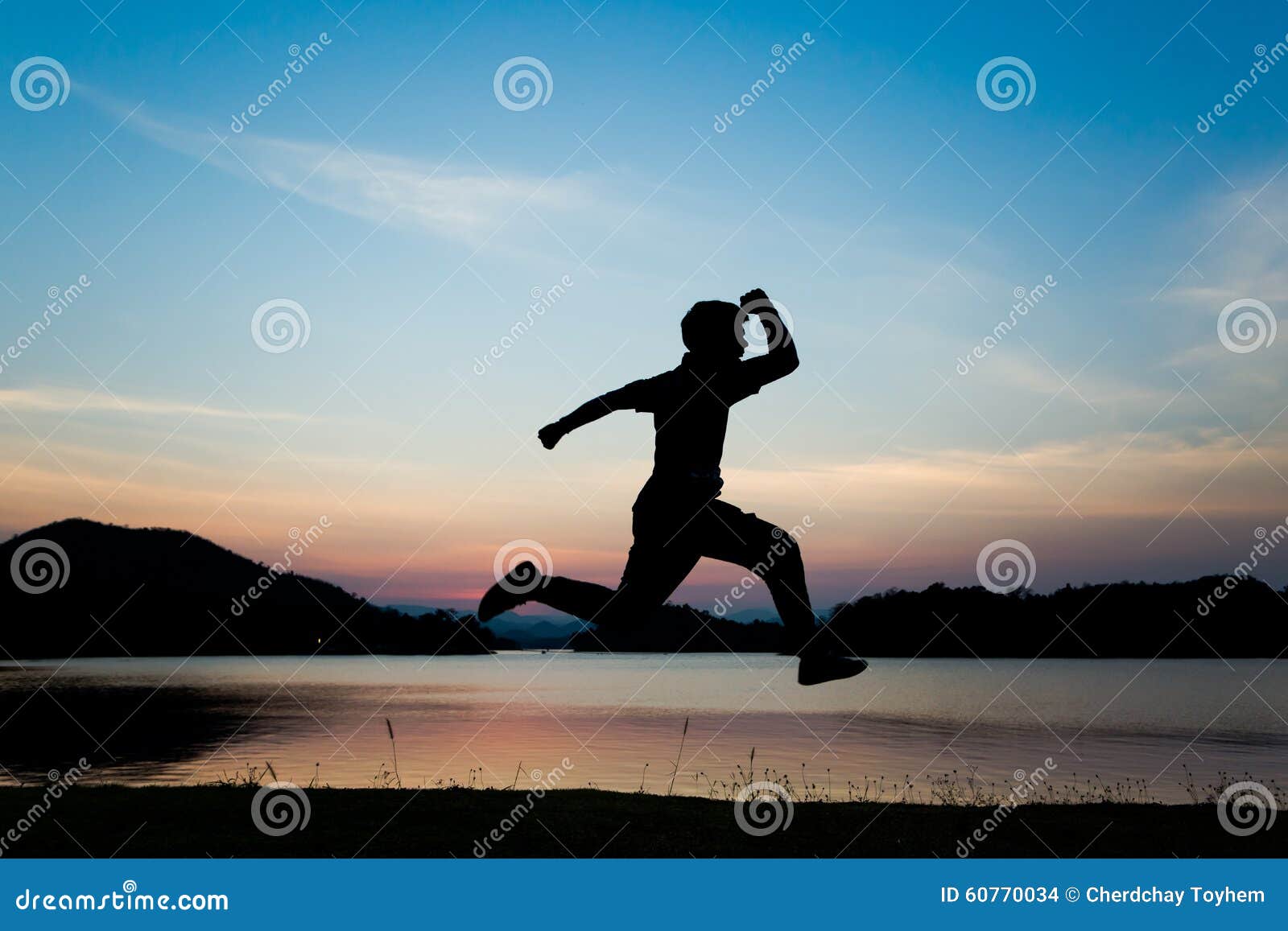 Silhouette Jumping in Sunset Sky. Stock Photo - Image of healthy ...