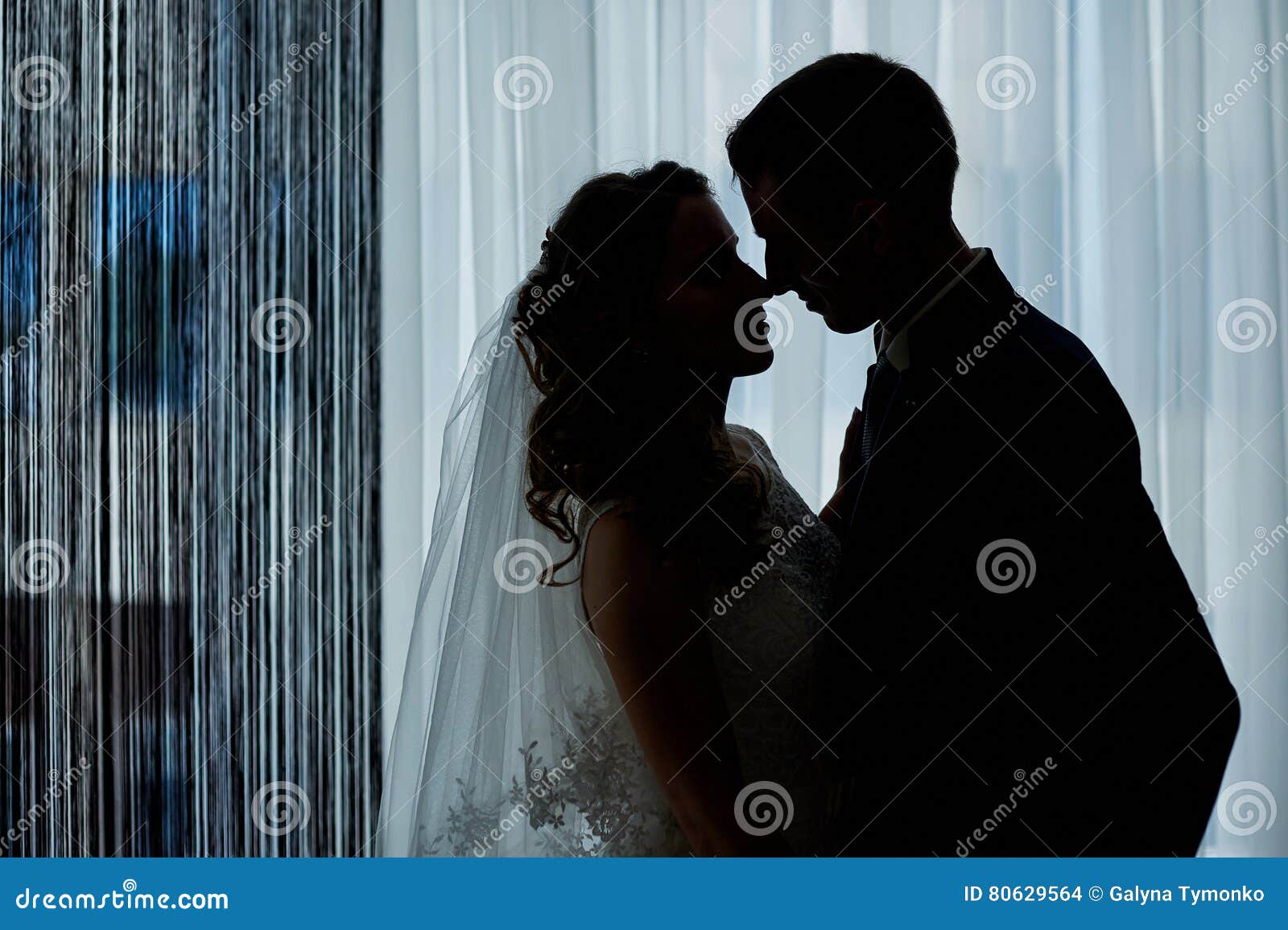 Silhouette Love Couples on a Background Window Stock Photo - Image of ...