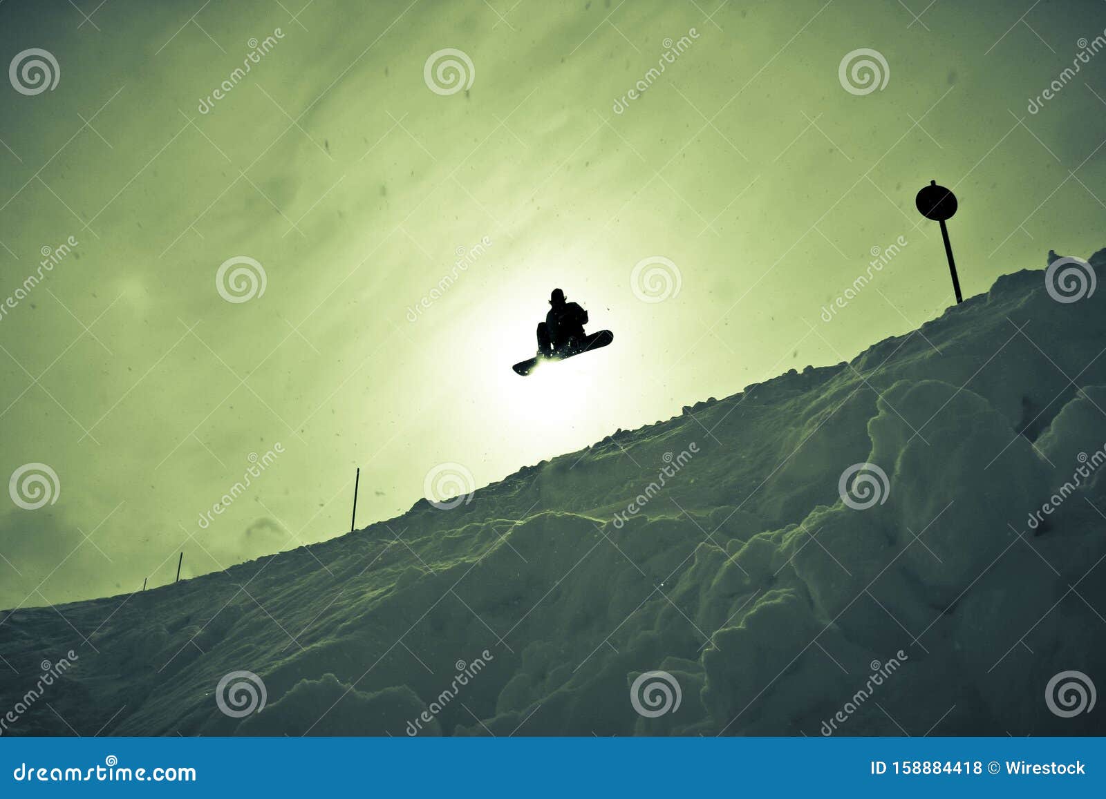 Silhouette of a Male Creating Snowboard Stunt Stock Photo - Image of ...
