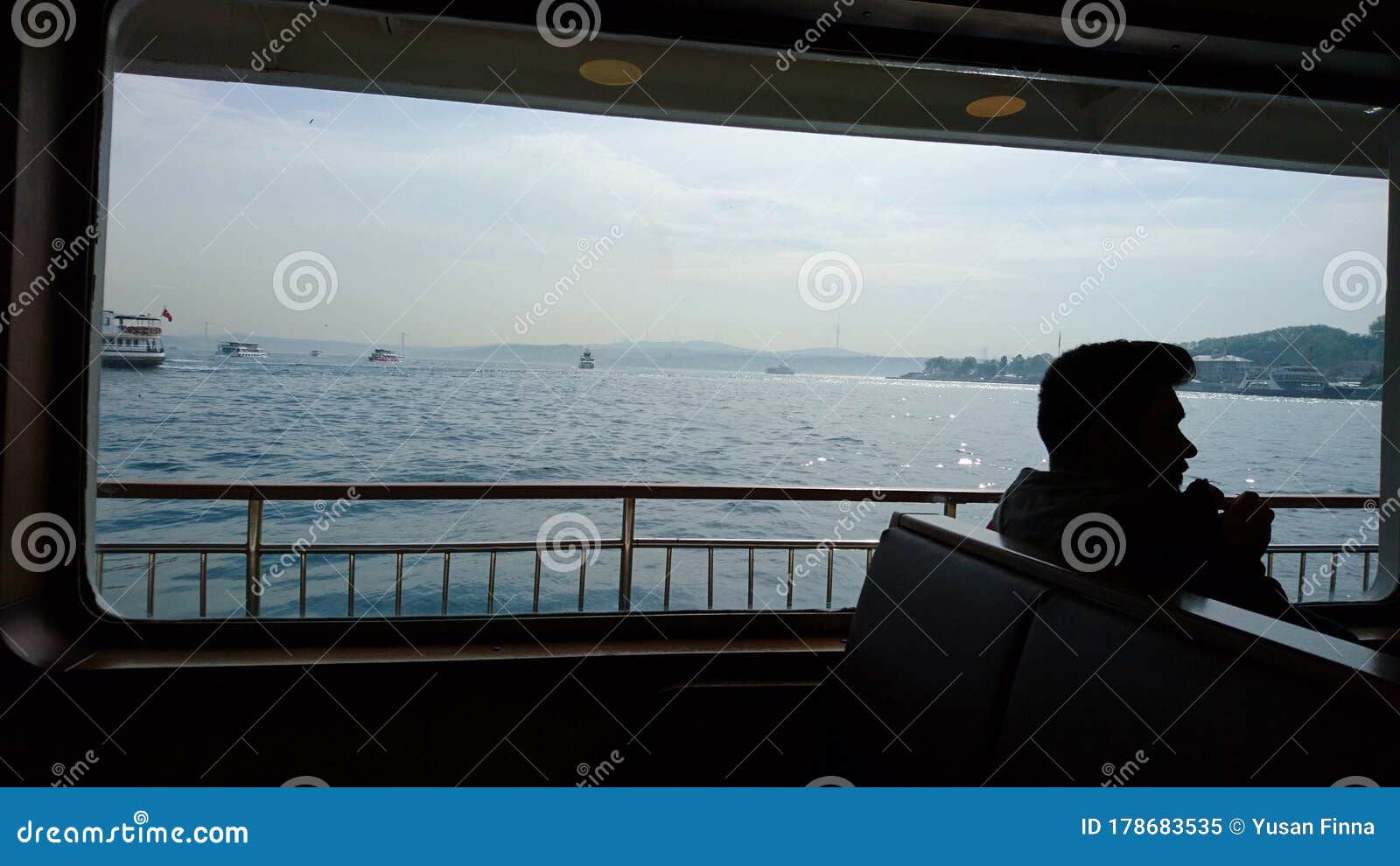 Silhouette of Man on Cruise Windows with Bosphorus View Stock Image ...
