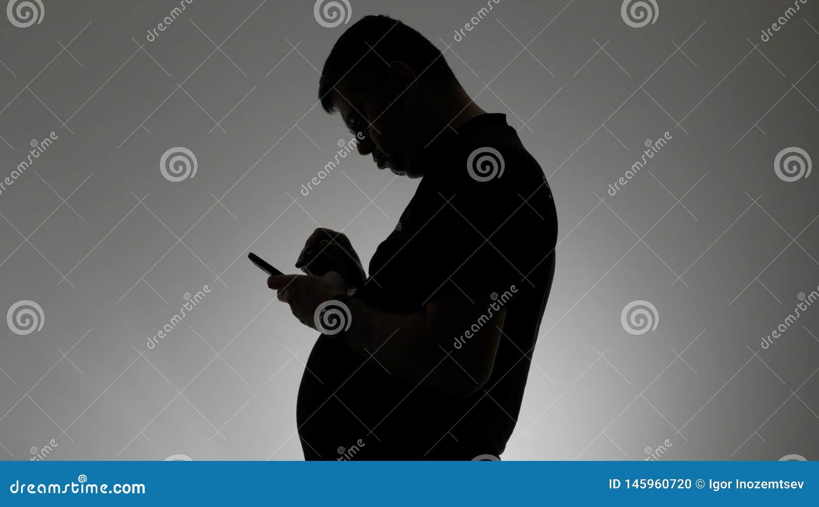 The Silhouette of a Man with a Curved Spine. a Stooping Man with a ...