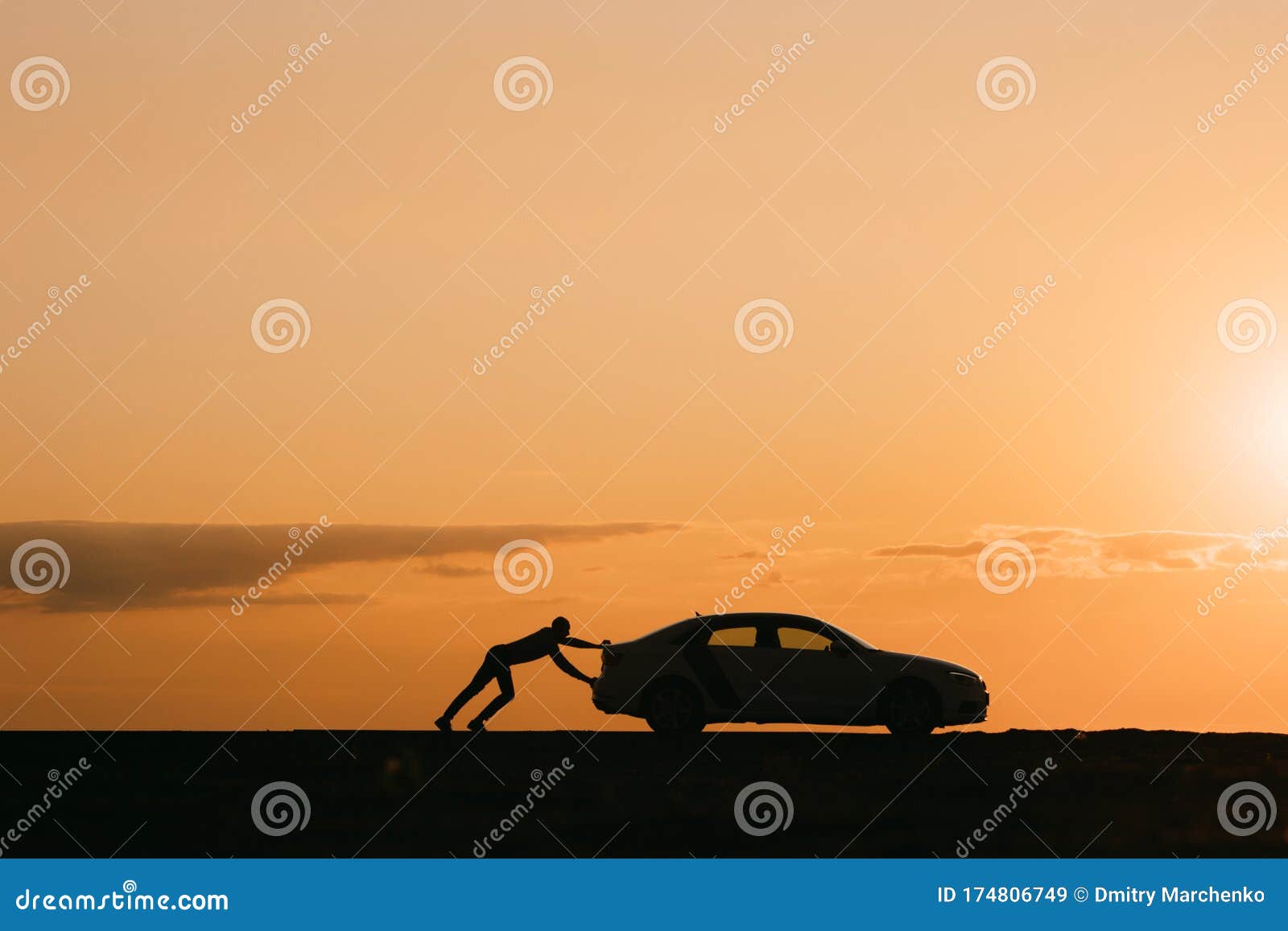 Silhouette of Man Driver Pushing His Car Along on Empty Road after ... Silhouette of Man Driver Pushing His Car Along on Empty Road after ...