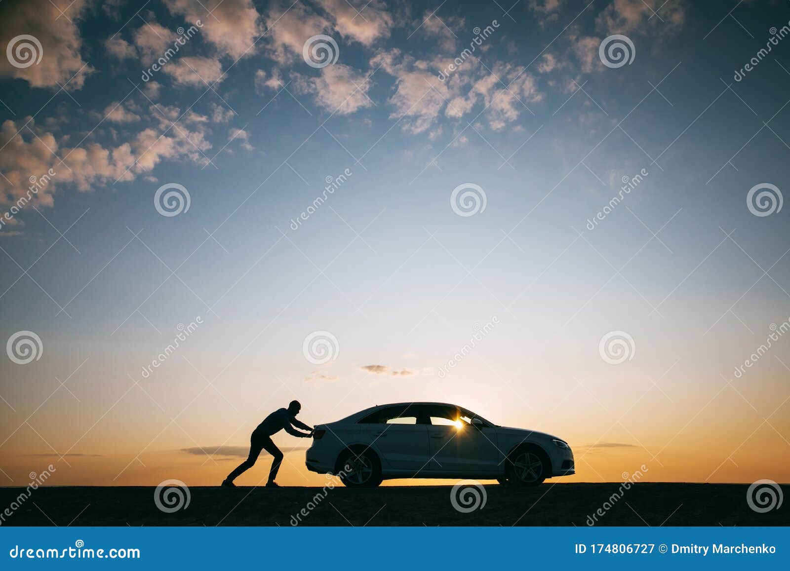 Silhouette of Man Driver Pushing His Car after Breakdown at Sunset ... Silhouette of Man Driver Pushing His Car after Breakdown at Sunset ...
