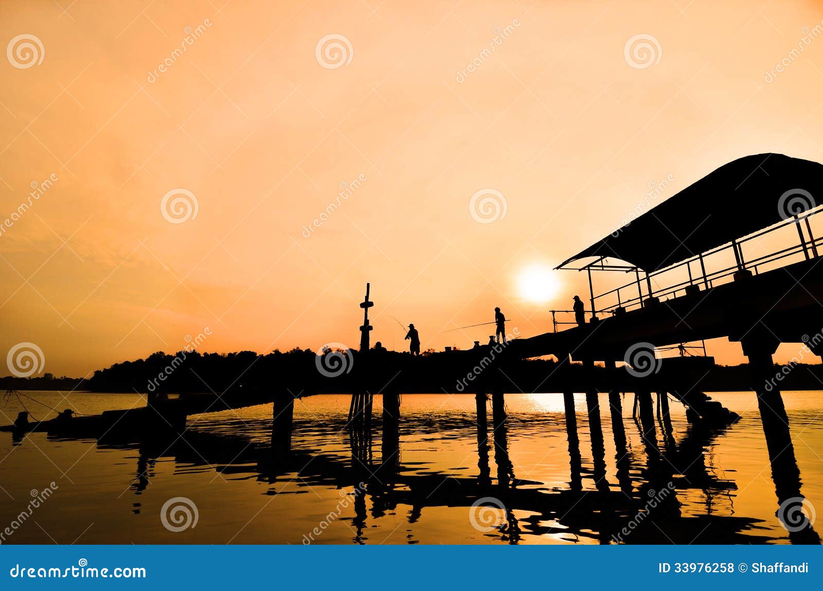 Silhouette Man Fishing at Jetty Stock Photo - Image of male, fisherman ...
