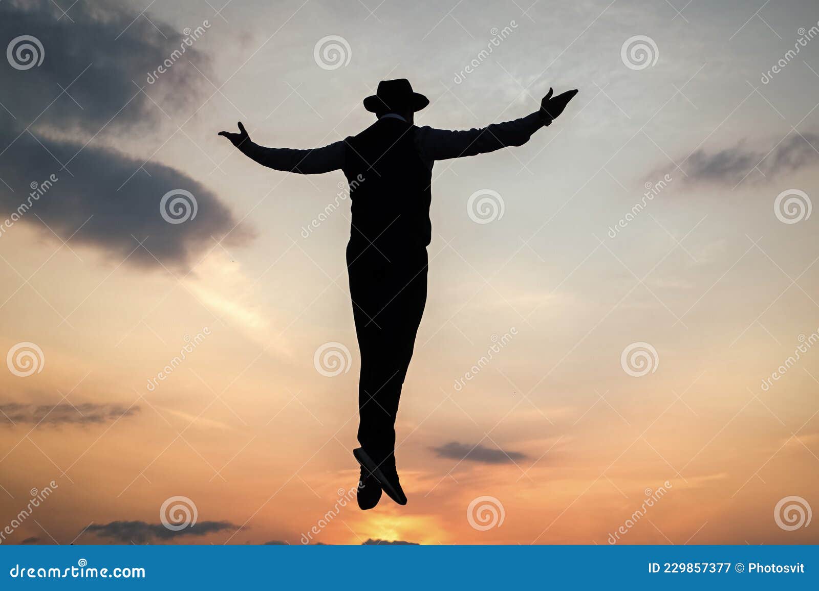 Silhouette Man Float Sunrise Sky Raised Hands Freedom Stock Photos ...