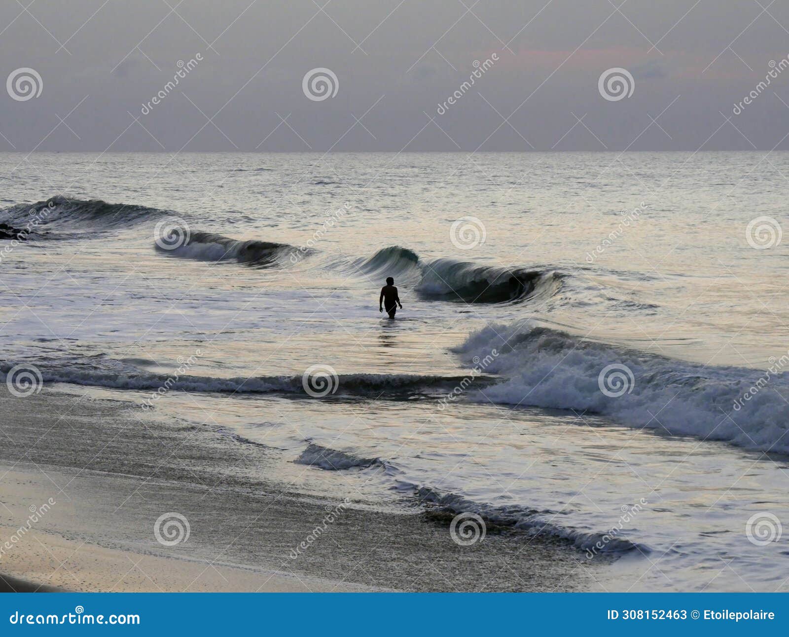 Silhouette of a Man Go To the Ocean, Facing the Waves Stock Image ...