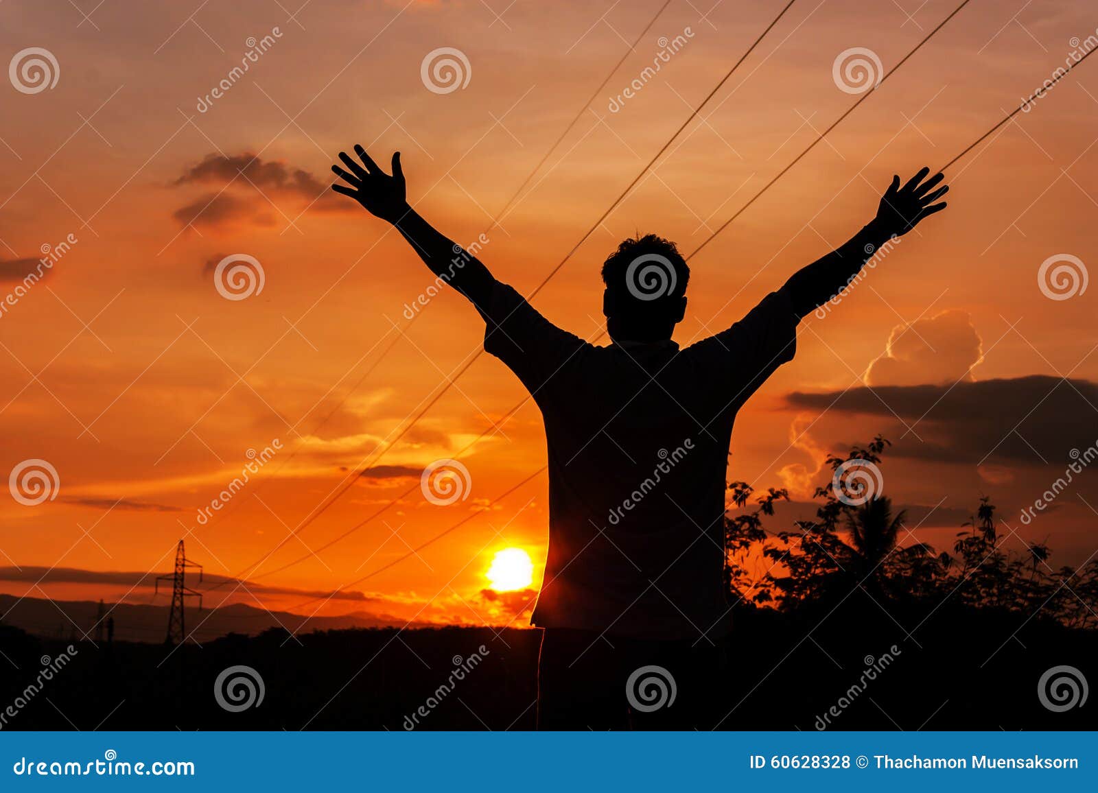 Silhouette of a Man with Hands Raised Stock Photo - Image of serenity ...