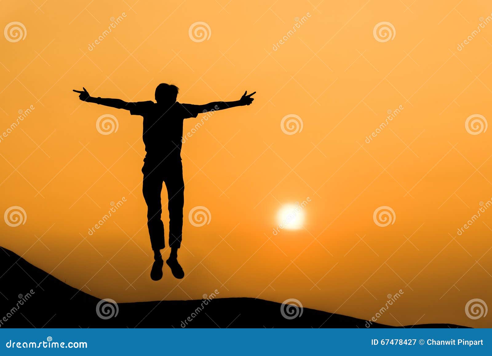 Silhouette of Man in Happy Jump on Orange Sunset Sky Stock Image ...