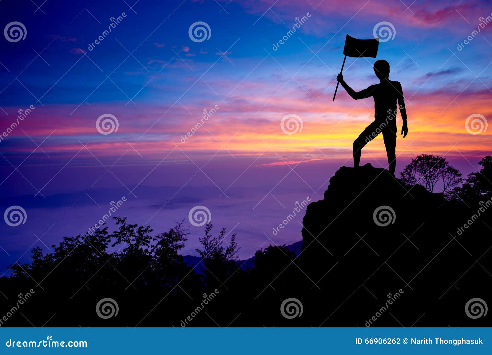 Silhouette of Man Holding Flag Standing on the Mountain Stock Photo ...