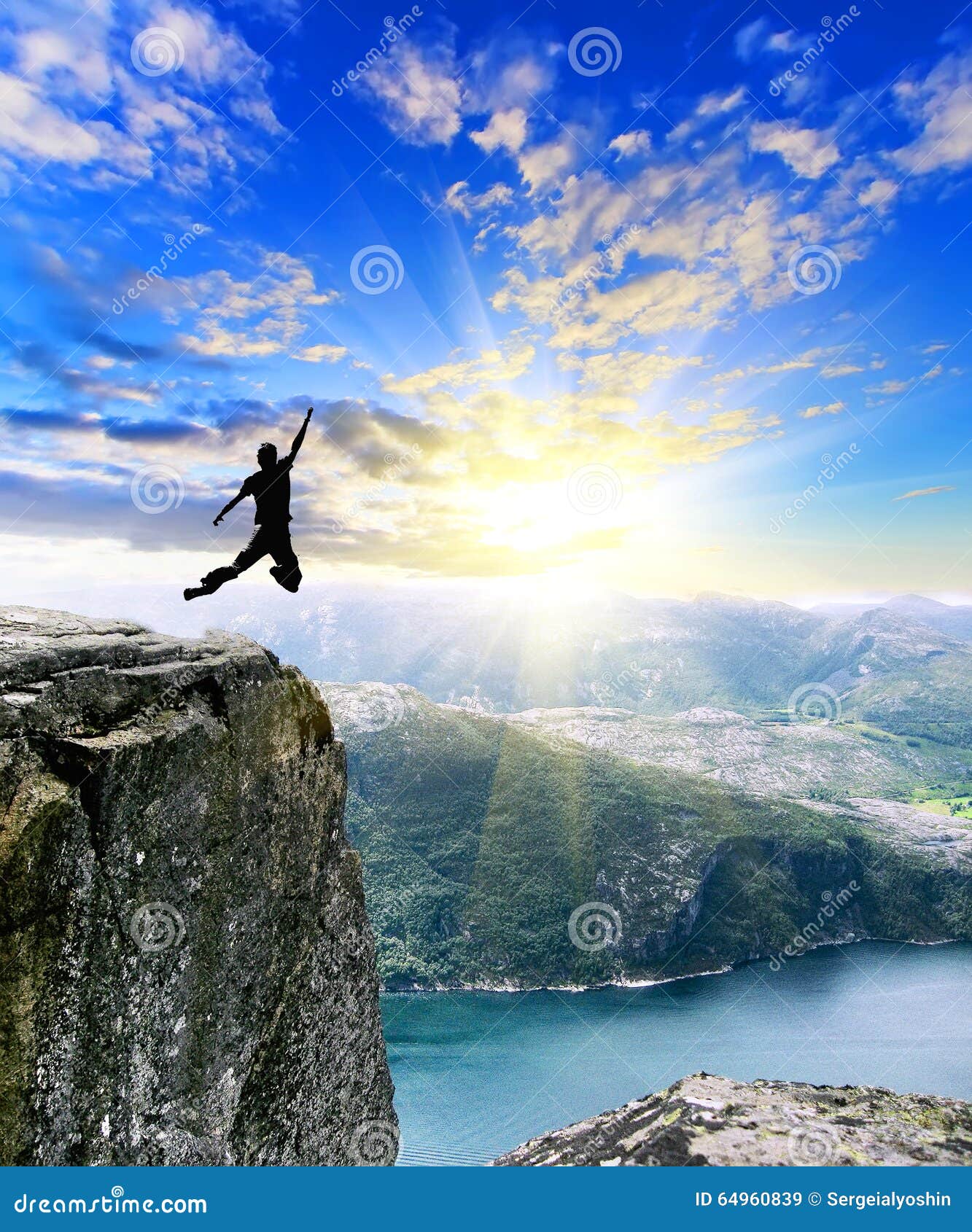 Silhouette of a Man on a Mountain Top Stock Image - Image of dusk ...