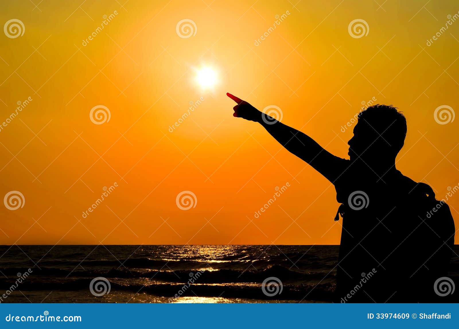 Silhouette of a Man Pointing Towards the Sun Stock Image - Image of ...