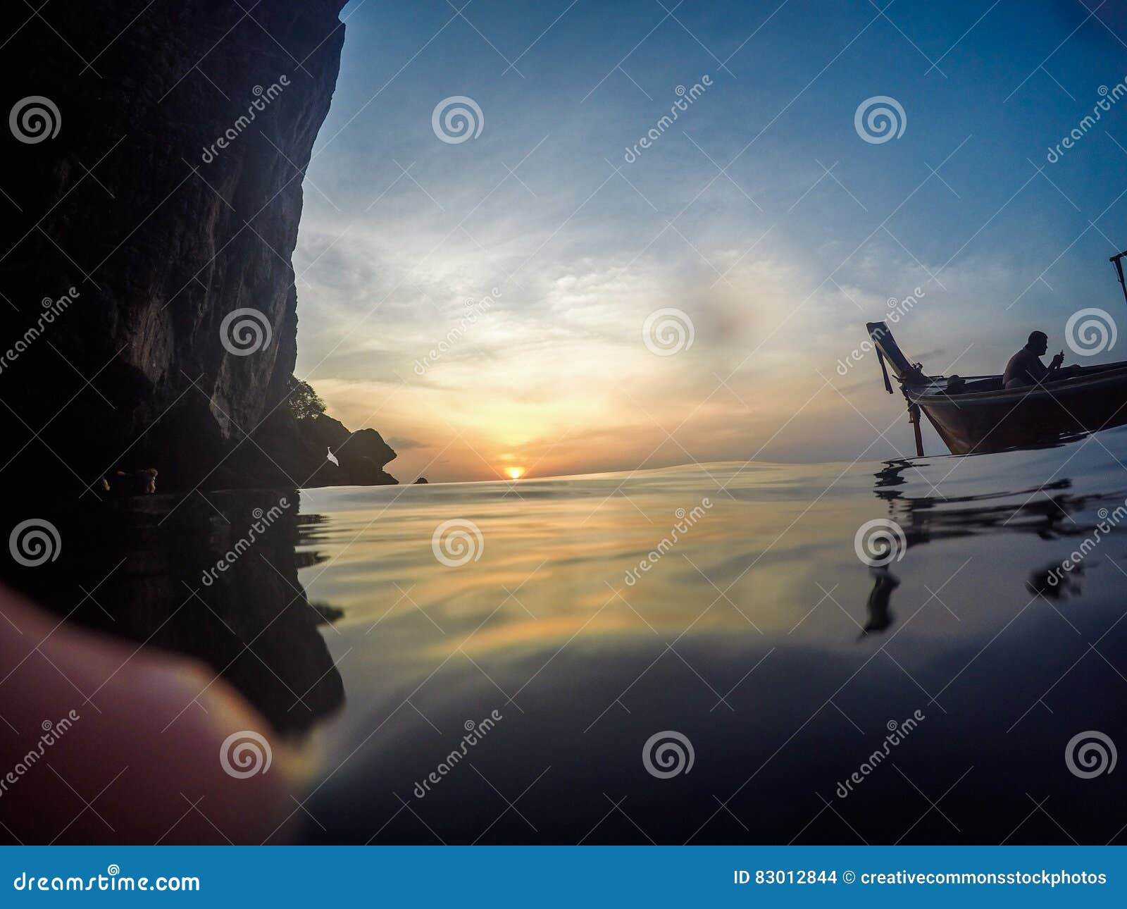 Silhouette Of Man Riding Boat Picture. Image: 83012844