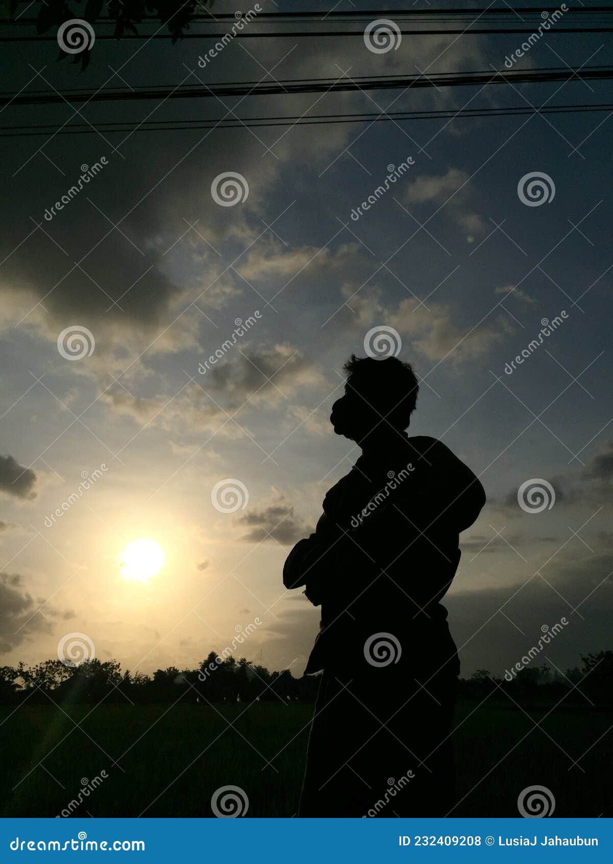 Man and sunset stock photo. Image of sunset, silhouette - 232409208