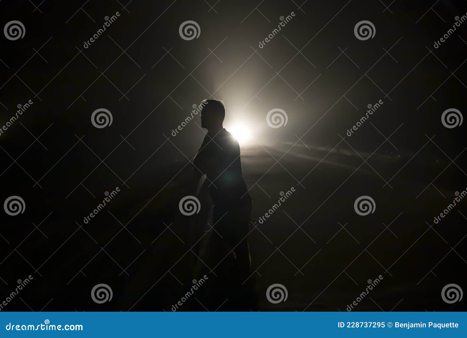 Silhouette of a Man Under a Street Light Stock Image - Image of sunrise ...