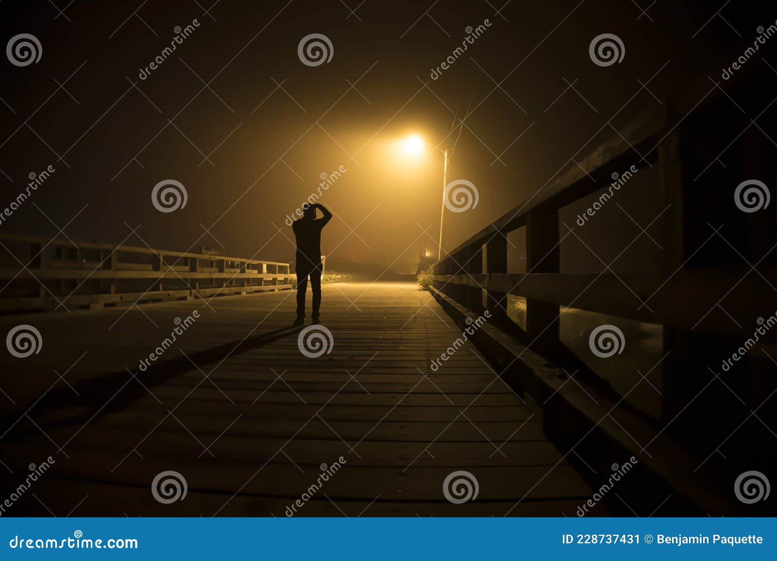 Silhouette of a Man Under a Street Light Stock Image - Image of cloud ...