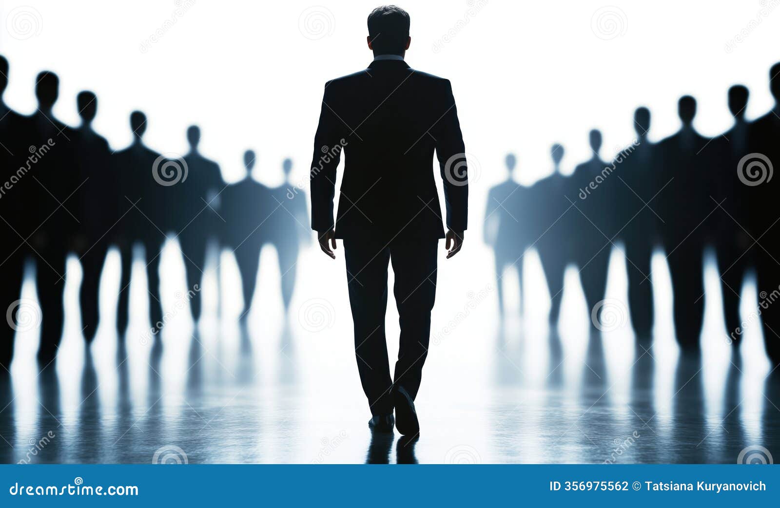 Silhouette of Man Walking Towards Light, Surrounded by Shadowy Figures ...
