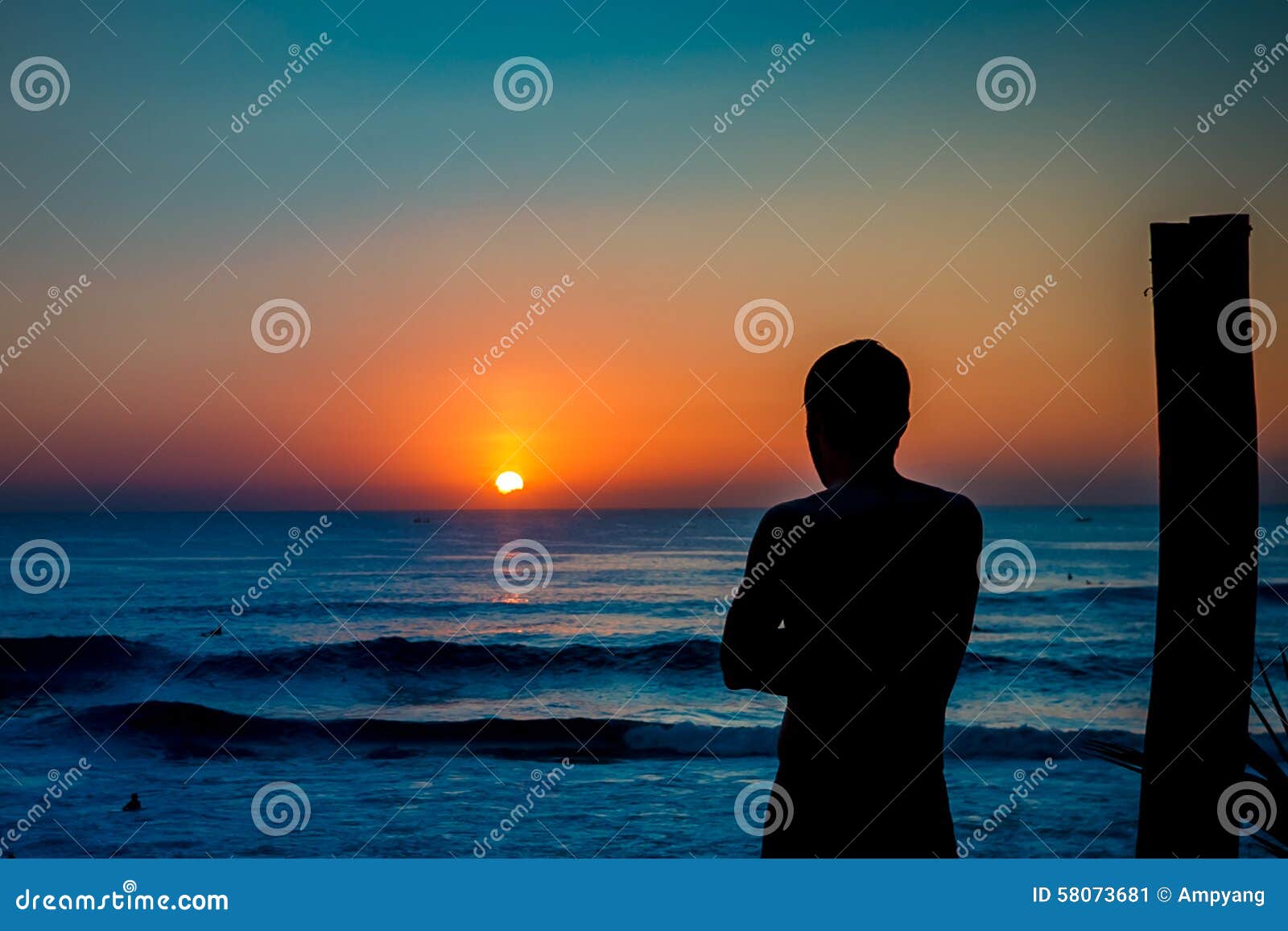 Silhouette of a Man Watching Sunset on the Beach Stock Image - Image of ...