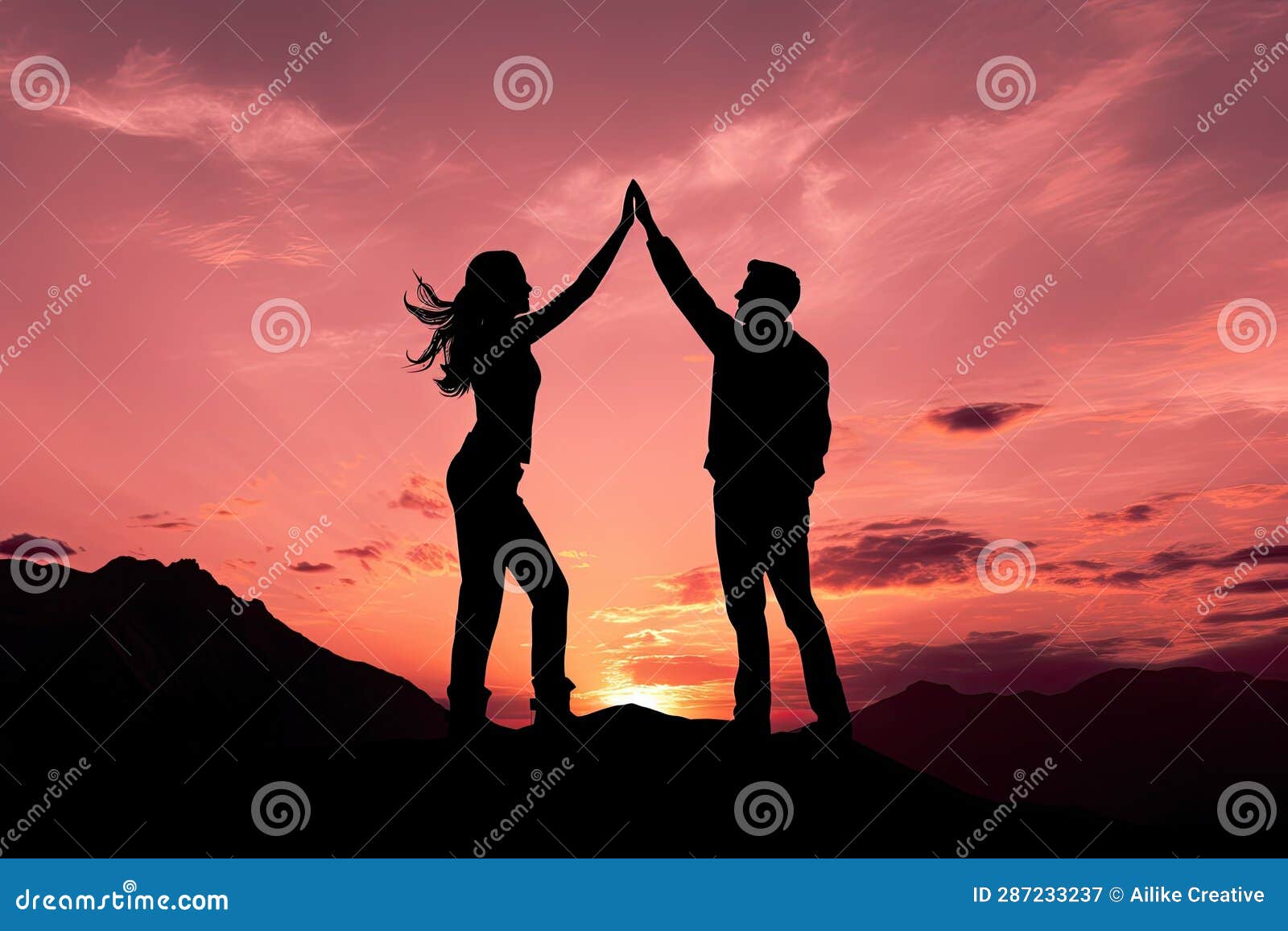 Silhouette of Man and Woman Giving High Five on Sunset Background Stock ...