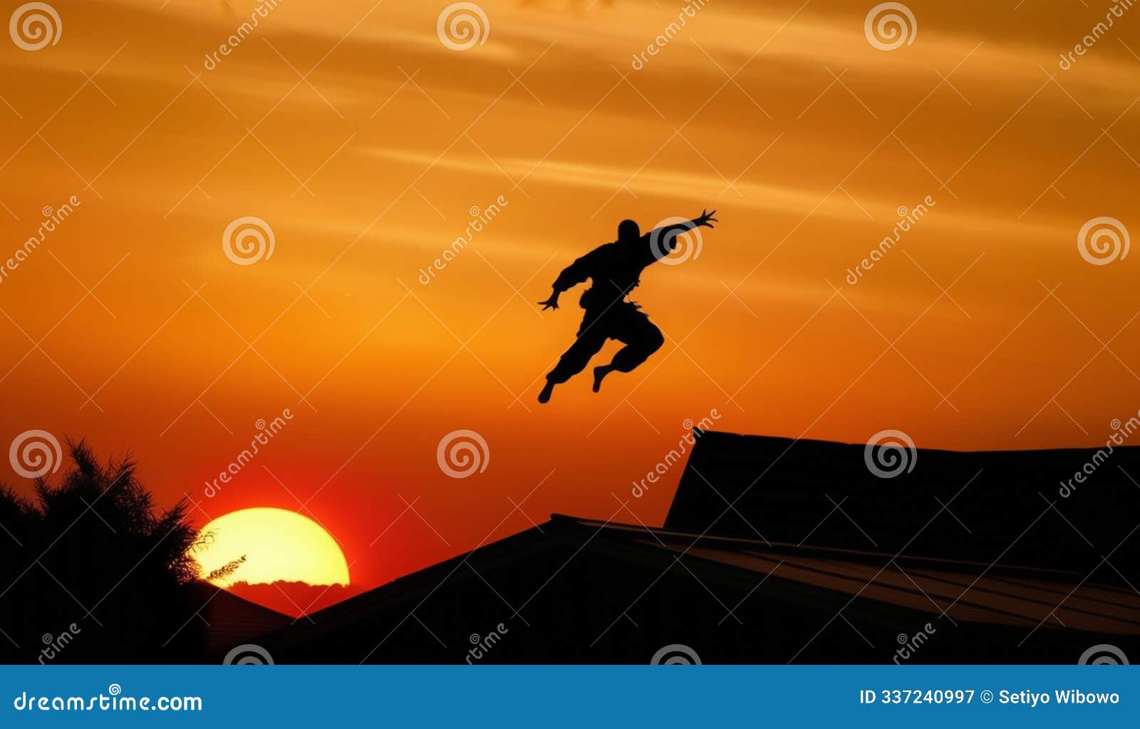 Silhouette of a Ninja Jumping Over a House with a Sunset Background ...