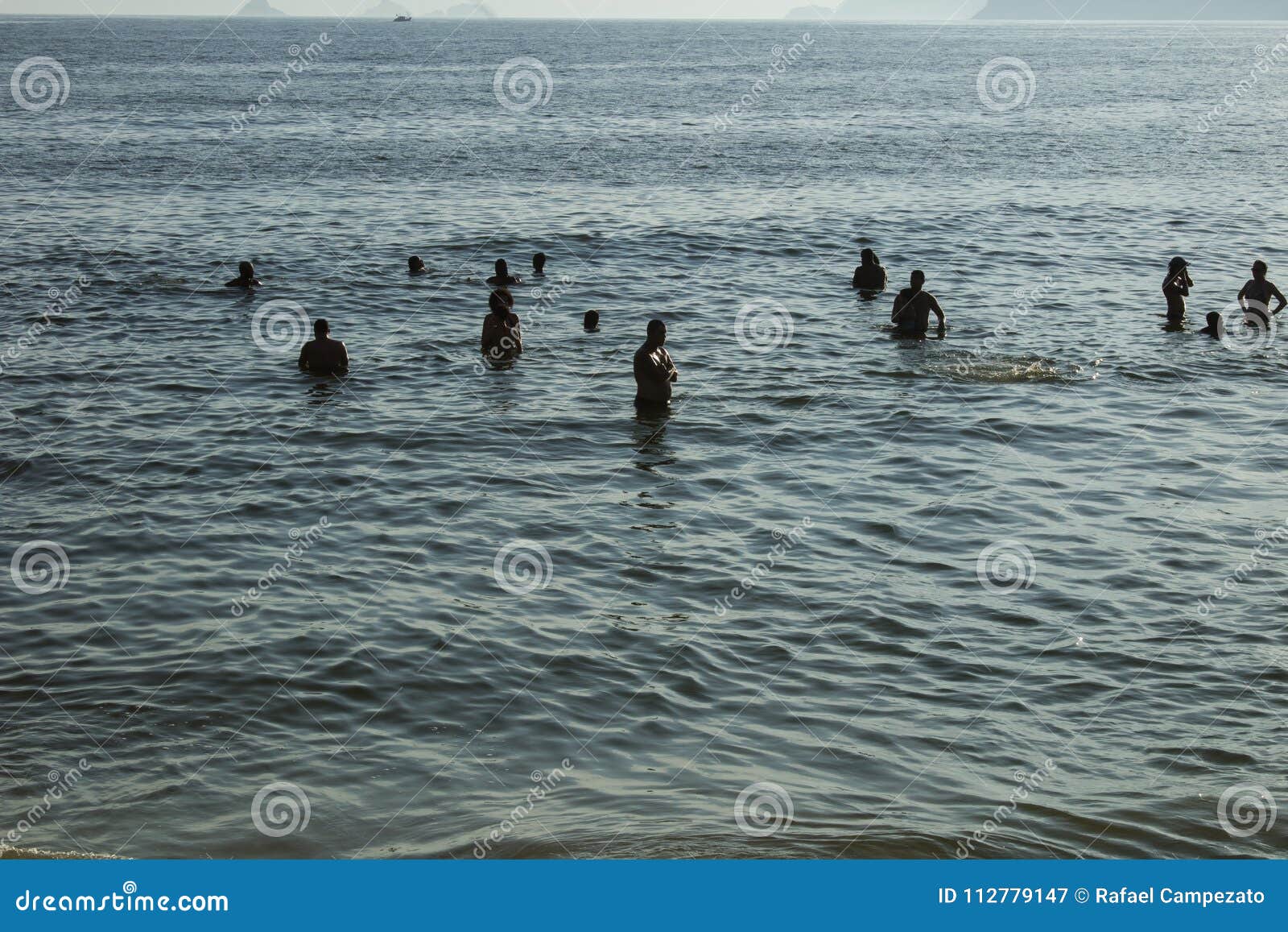 Silhouette of People Inside the Sea Editorial Photography - Image of ...