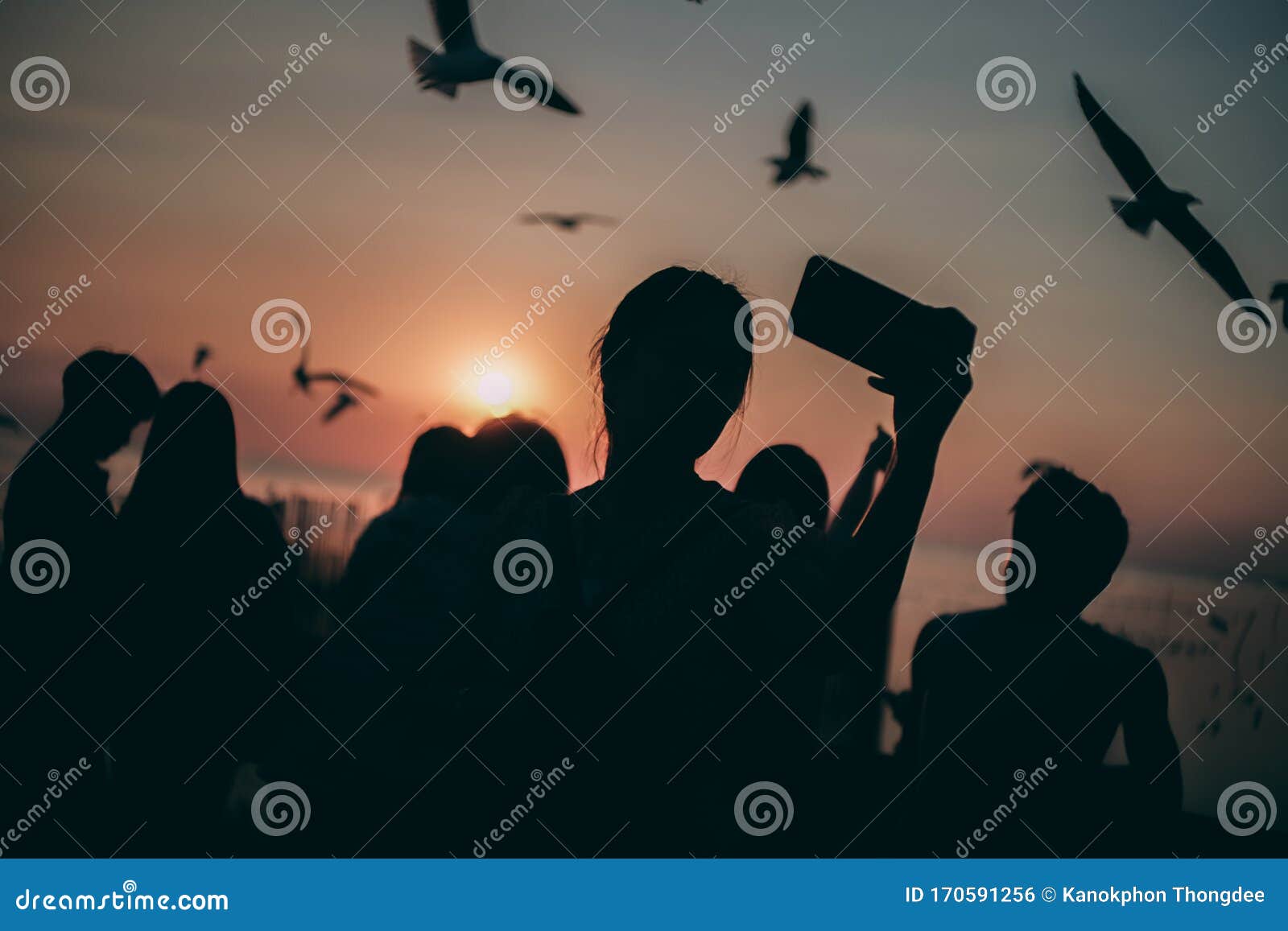 Silhouette of People on Sunset Stock Photo - Image of cloud, orange ...