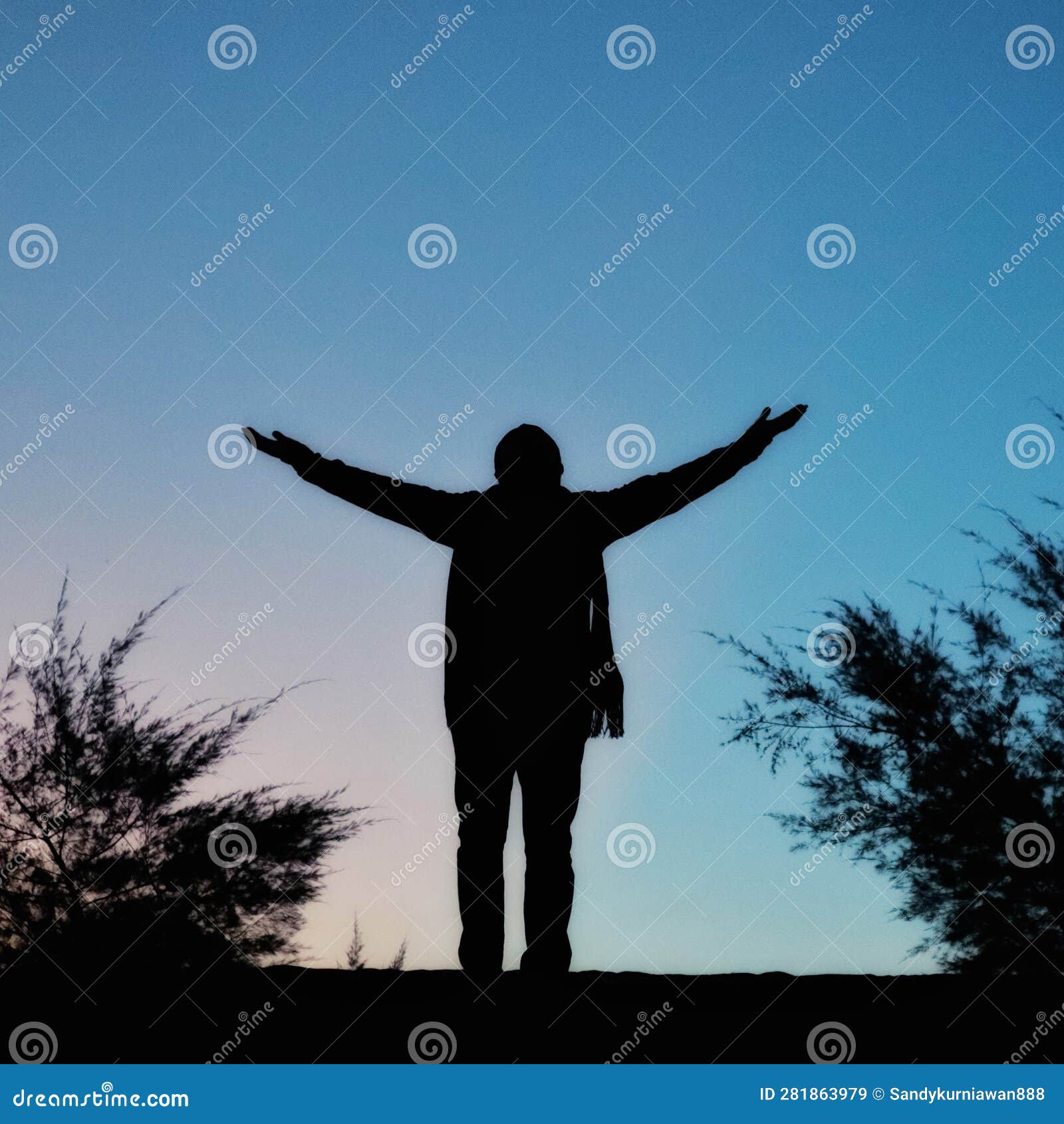Silhouette of a Person Extending Both Arms To the Sky Stock Image ...