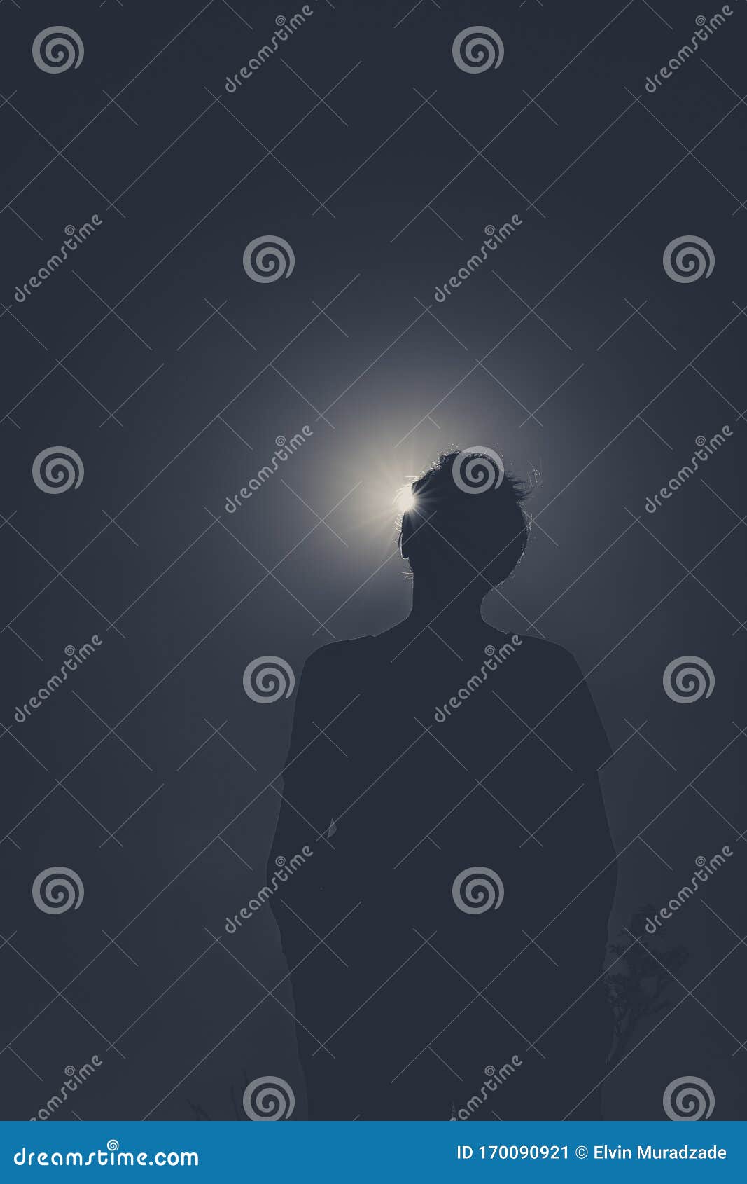 Silhouette of a Person with Sun Behind Causing Sun Eclipse Effect Stock ...