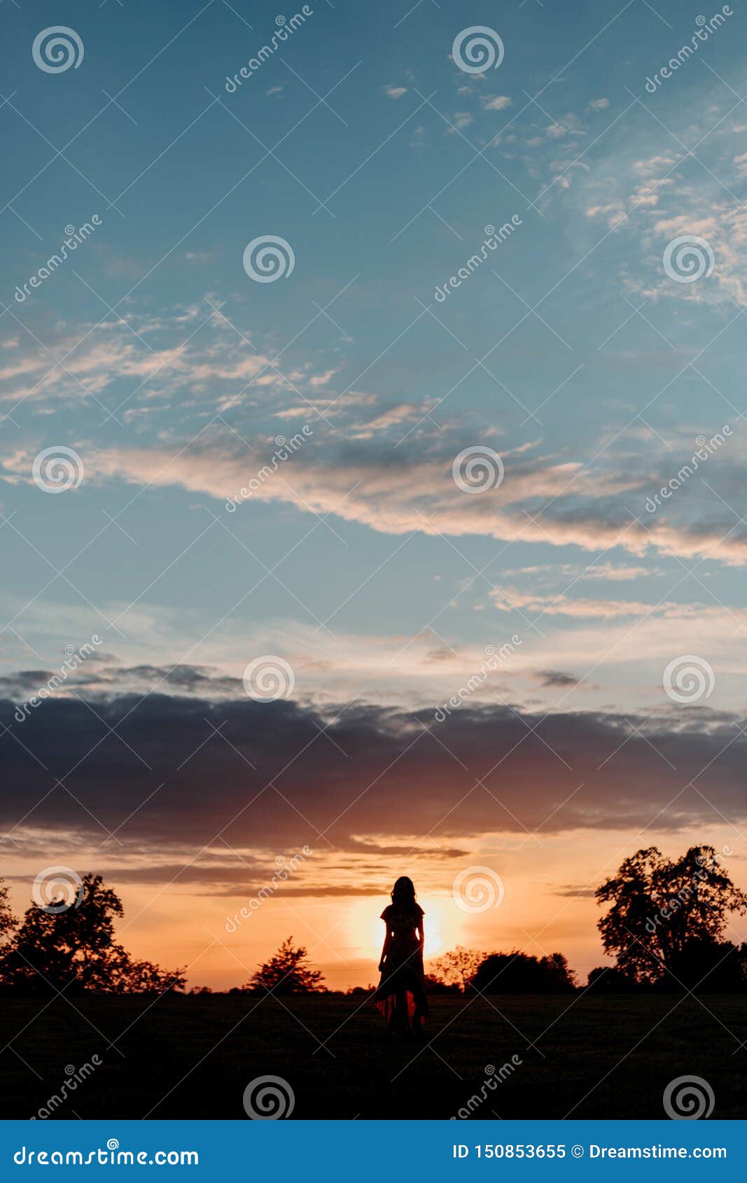 Silhouette of Person at Sunset Stock Image - Image of person, setting ...
