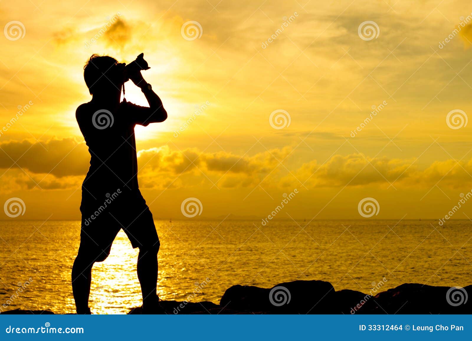 Silhouette of Photographer at Sunset Stock Photo - Image of coast ...