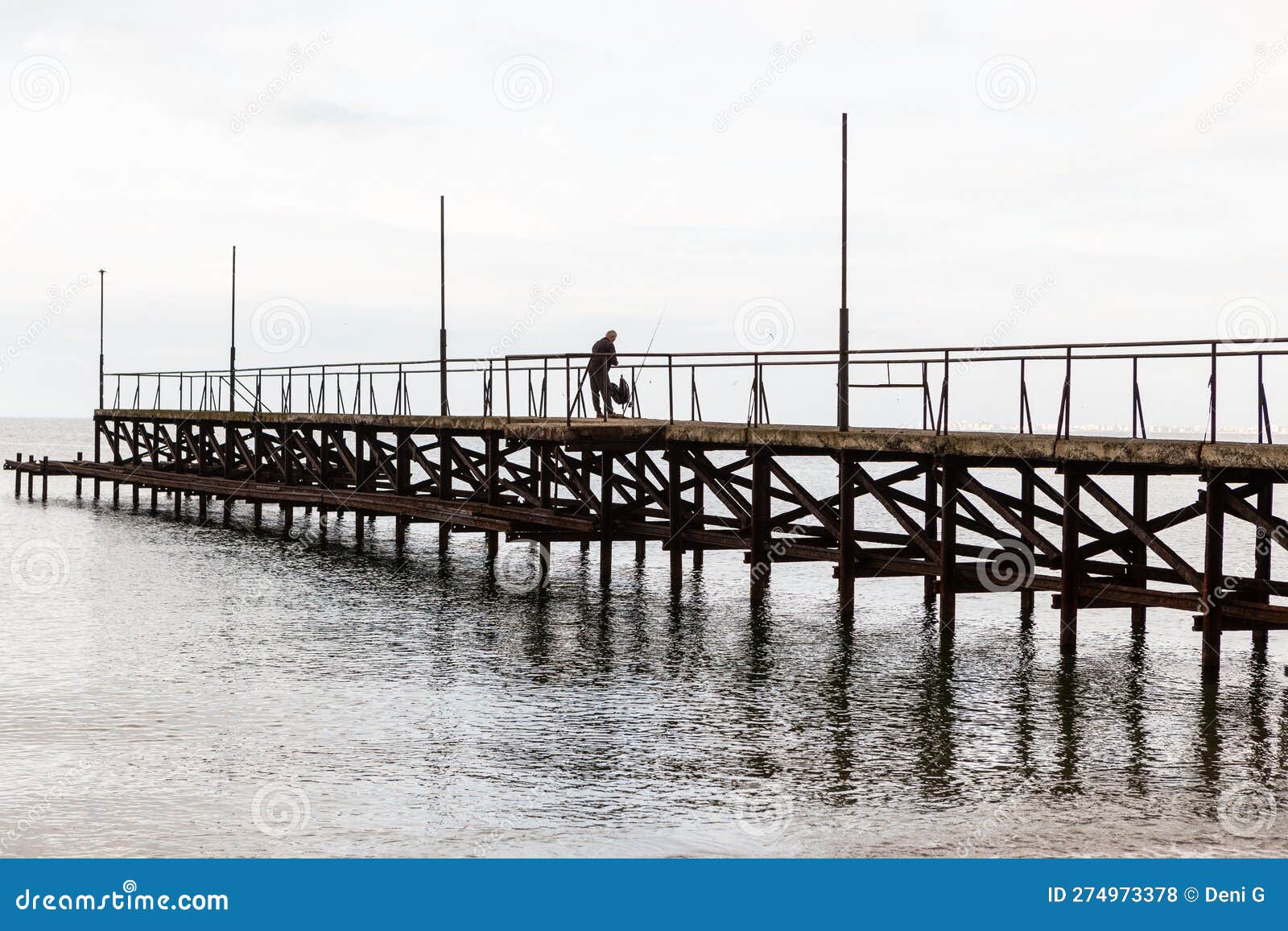 Silhouette of a Pier on the Seashore Stock Photo - Image of nature ...
