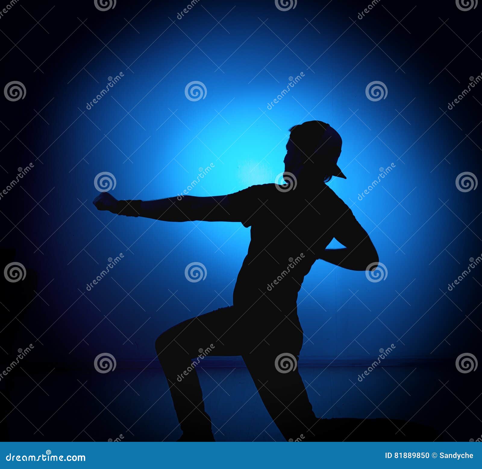 Silhouette Rocker Man Posing on Blue Background Stock Photo - Image of ...