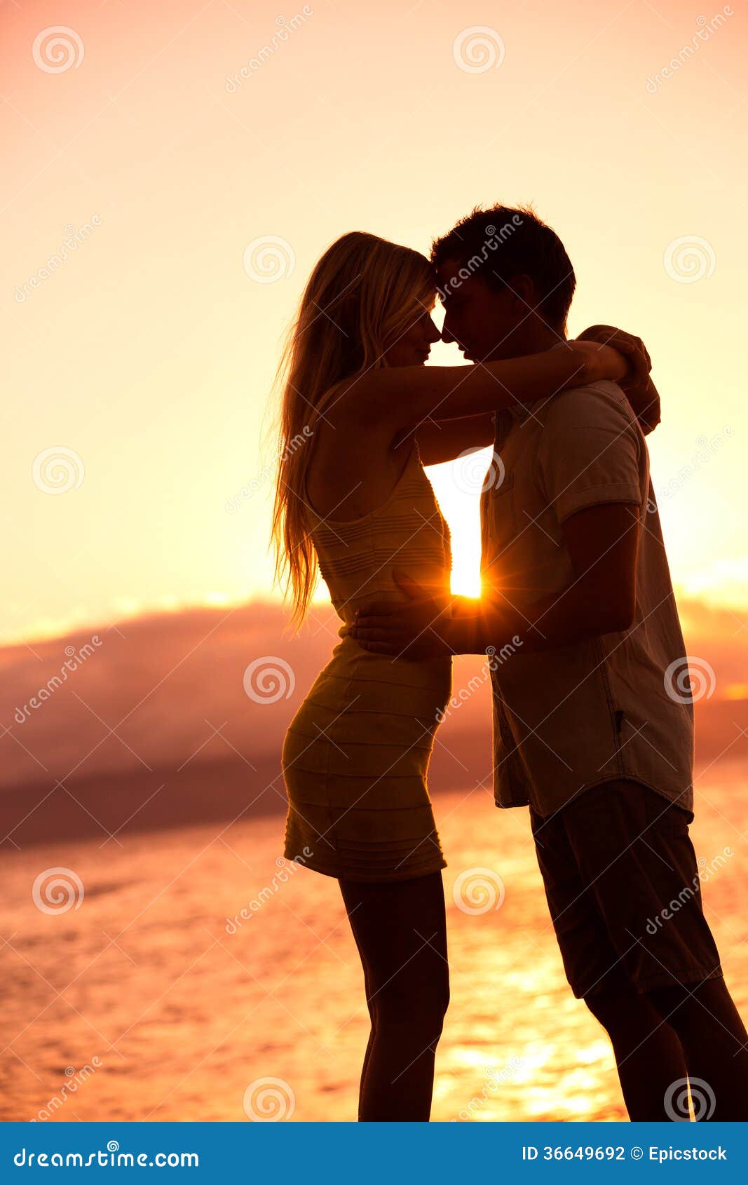 Silhouette of Romantic Couple Kissing at Sunset Stock Photo - Image of beach, sand: 36649692