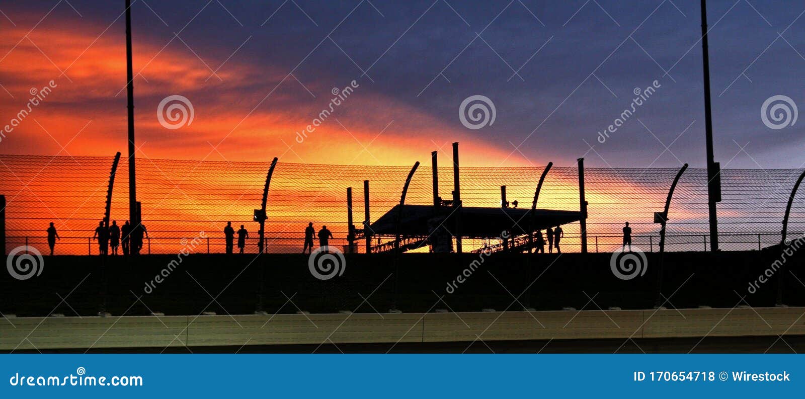 Silhouette Shot of Busy People with a Scenery of Sunset Stock Photo ...