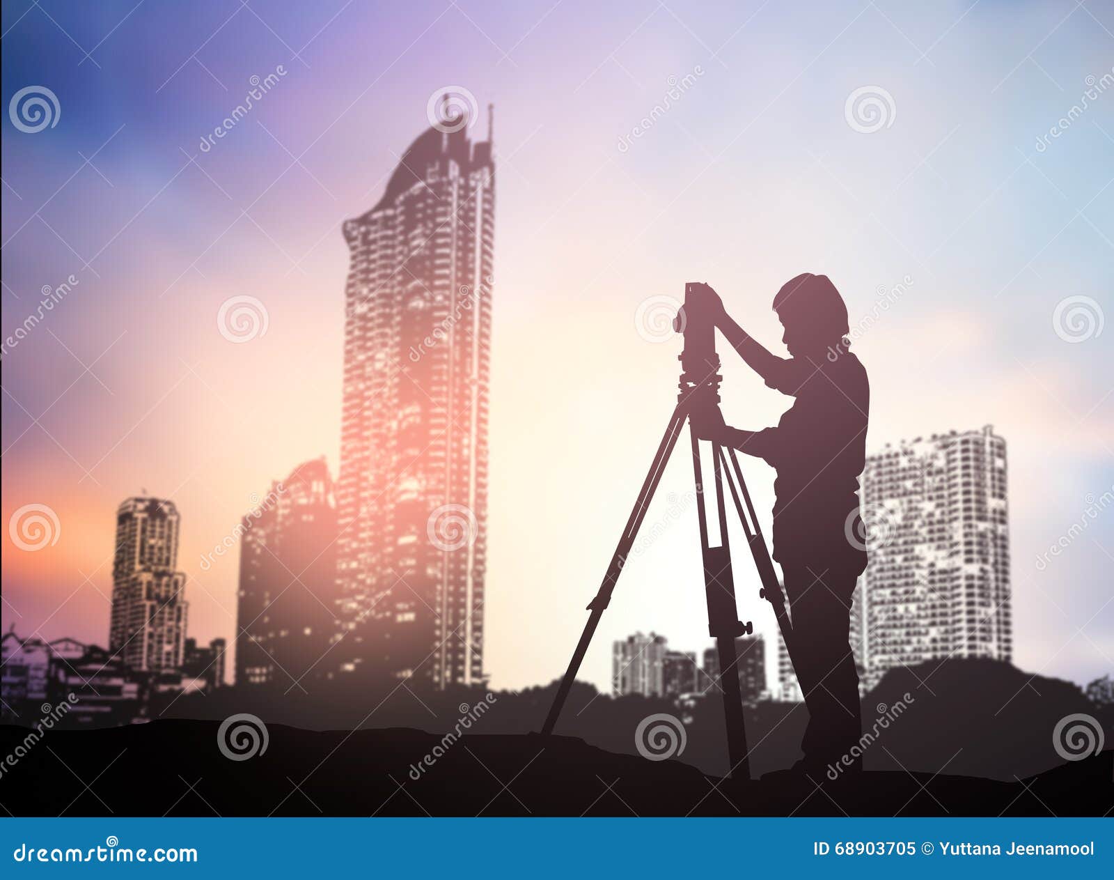 Silhouette Survey Engineer Working in a Building Site Over Blur Stock ...