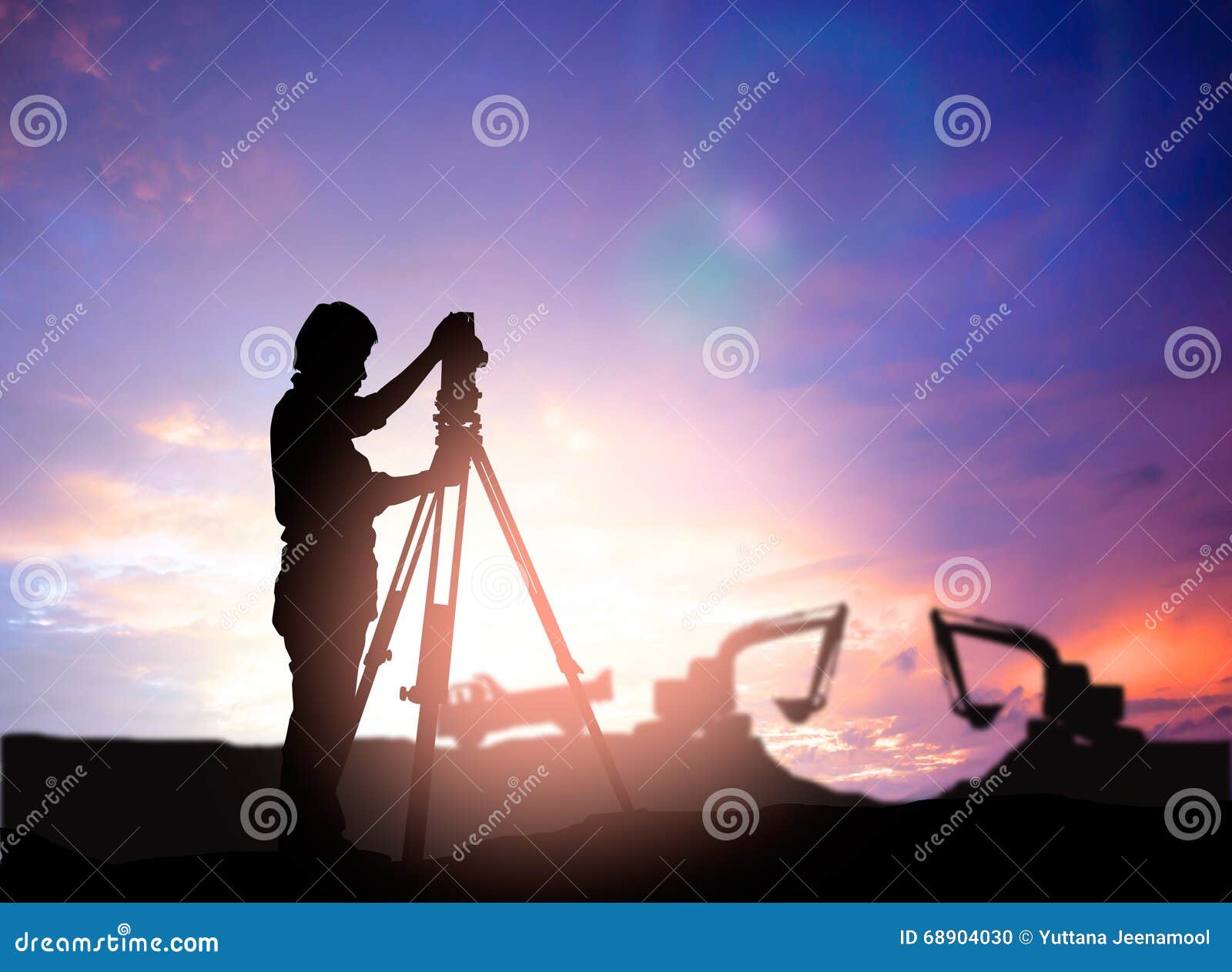 Silhouette Survey Engineer Working in a Building Site Over Blur Stock ...